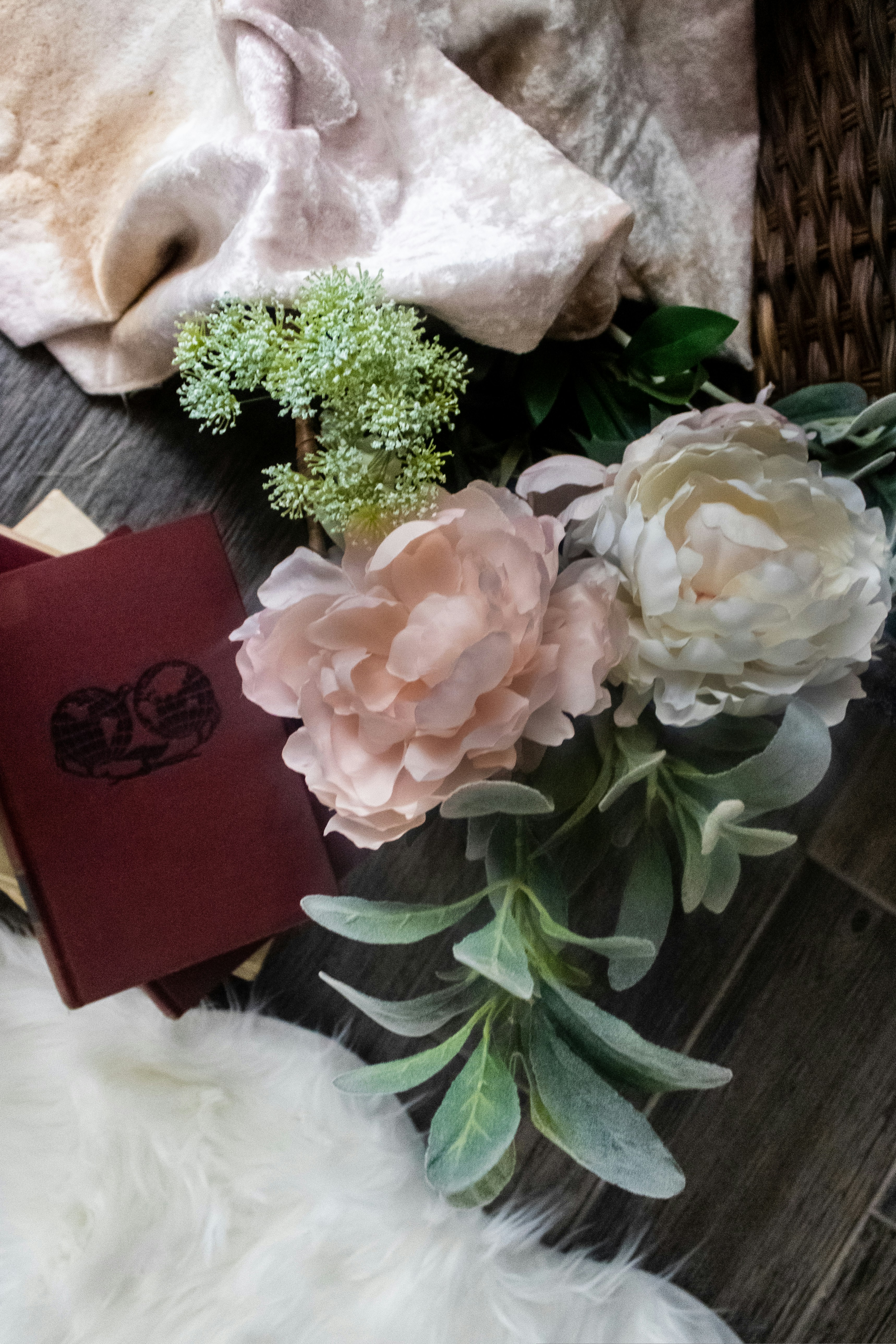 pink and white flowers on red paper