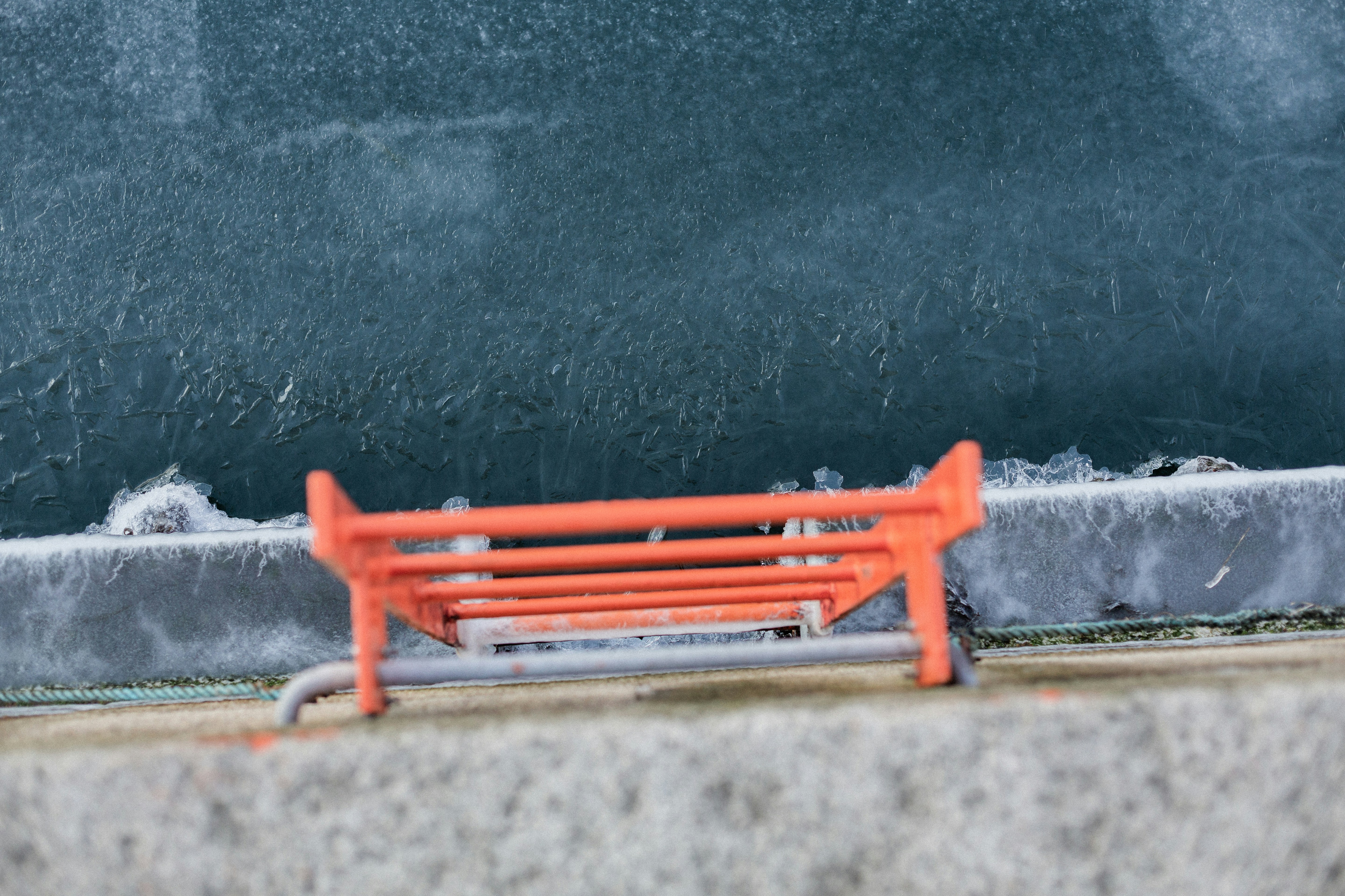Red metal frame on gray concrete floor photo – Free Copenhagen Image on ...