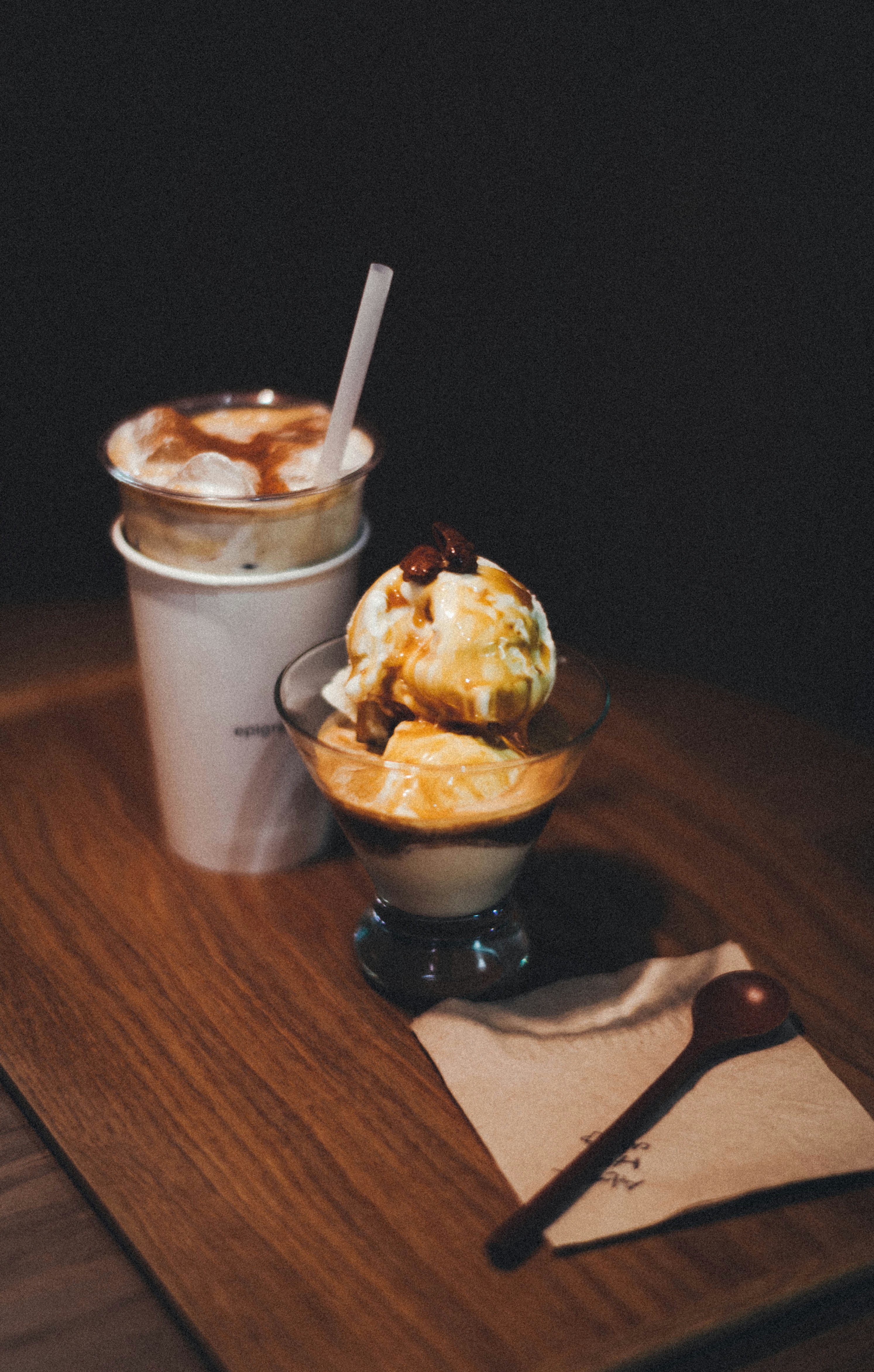 Two Coffee Creations on a Warm Wood Stage