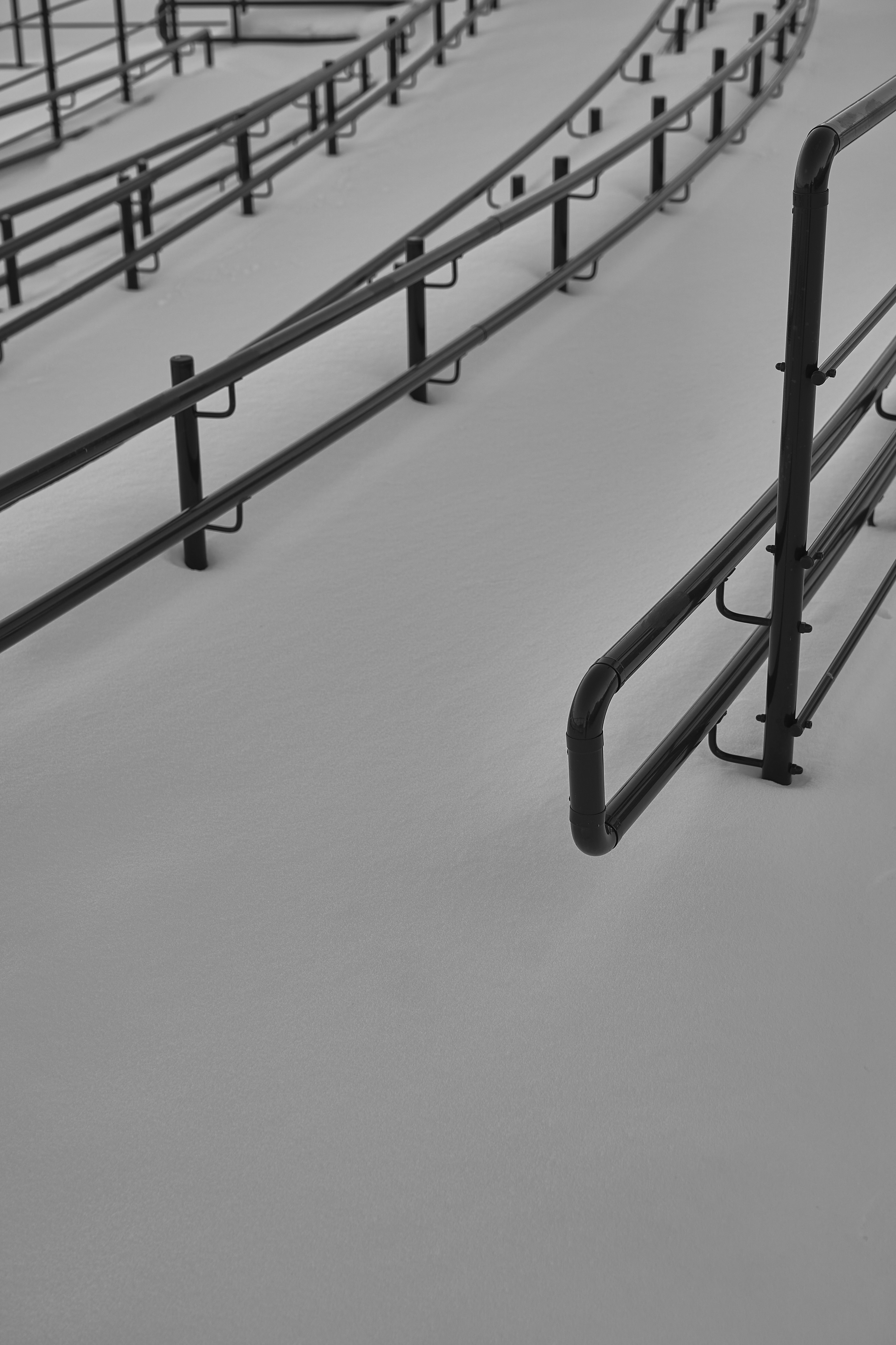 stainless steel hand rail on white wall