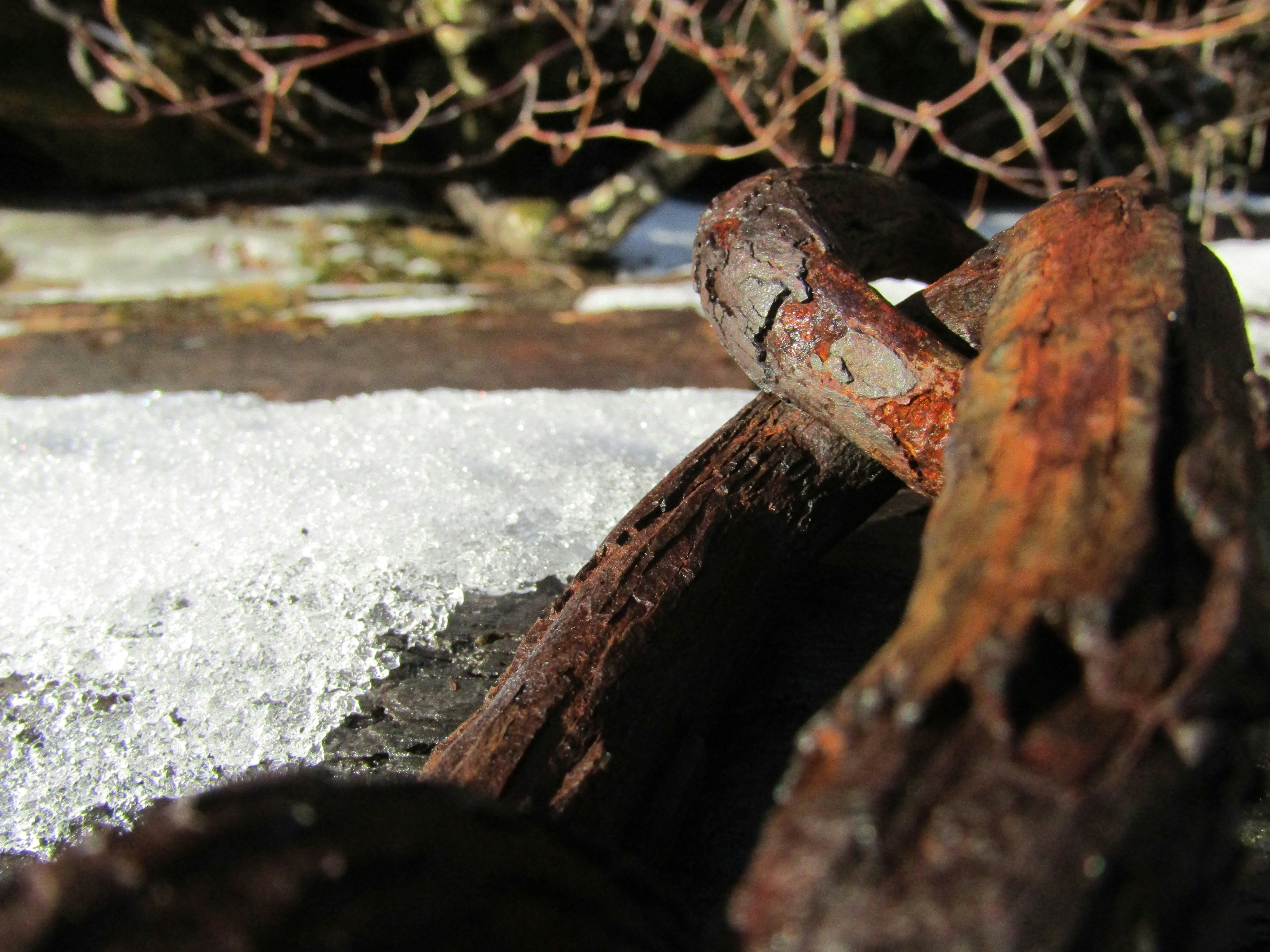 Timeworn Ring on Snow-Cooled Rails: A Study in Rust and Ice