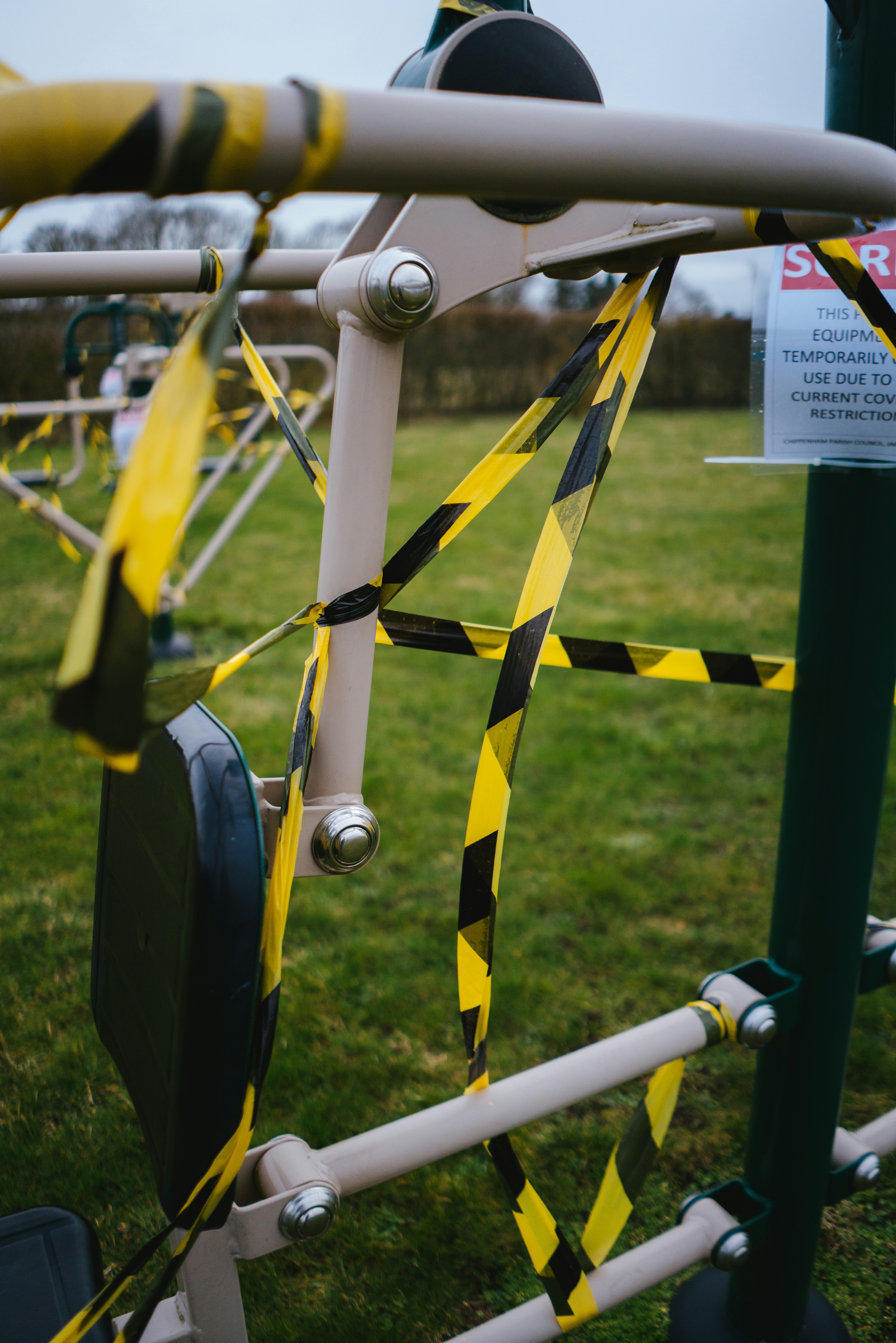 Blue and yellow striped flag on white metal fence photo – Free Banned ...