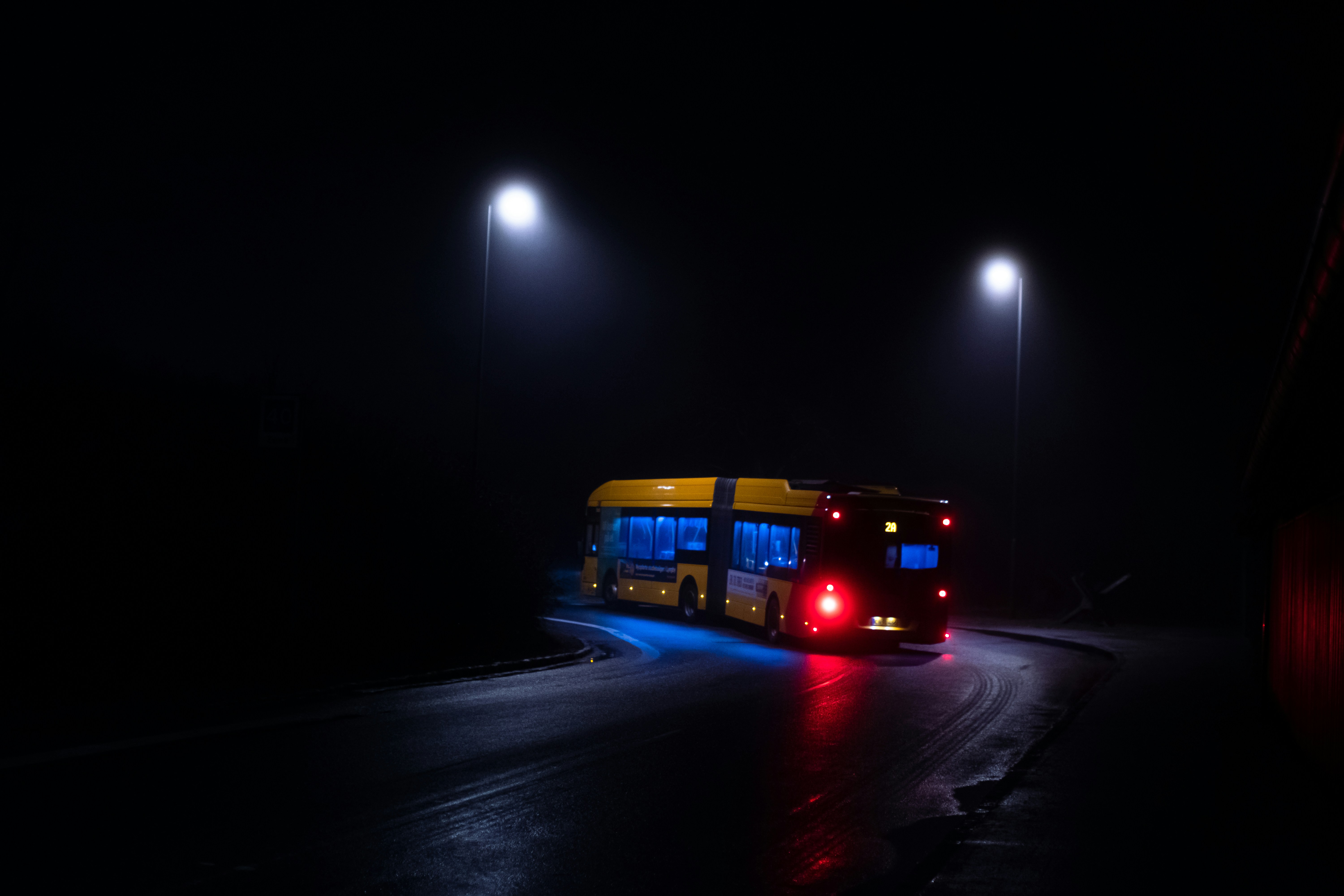 Red bus on road during nighttime photo – Free Dark Image on Unsplash