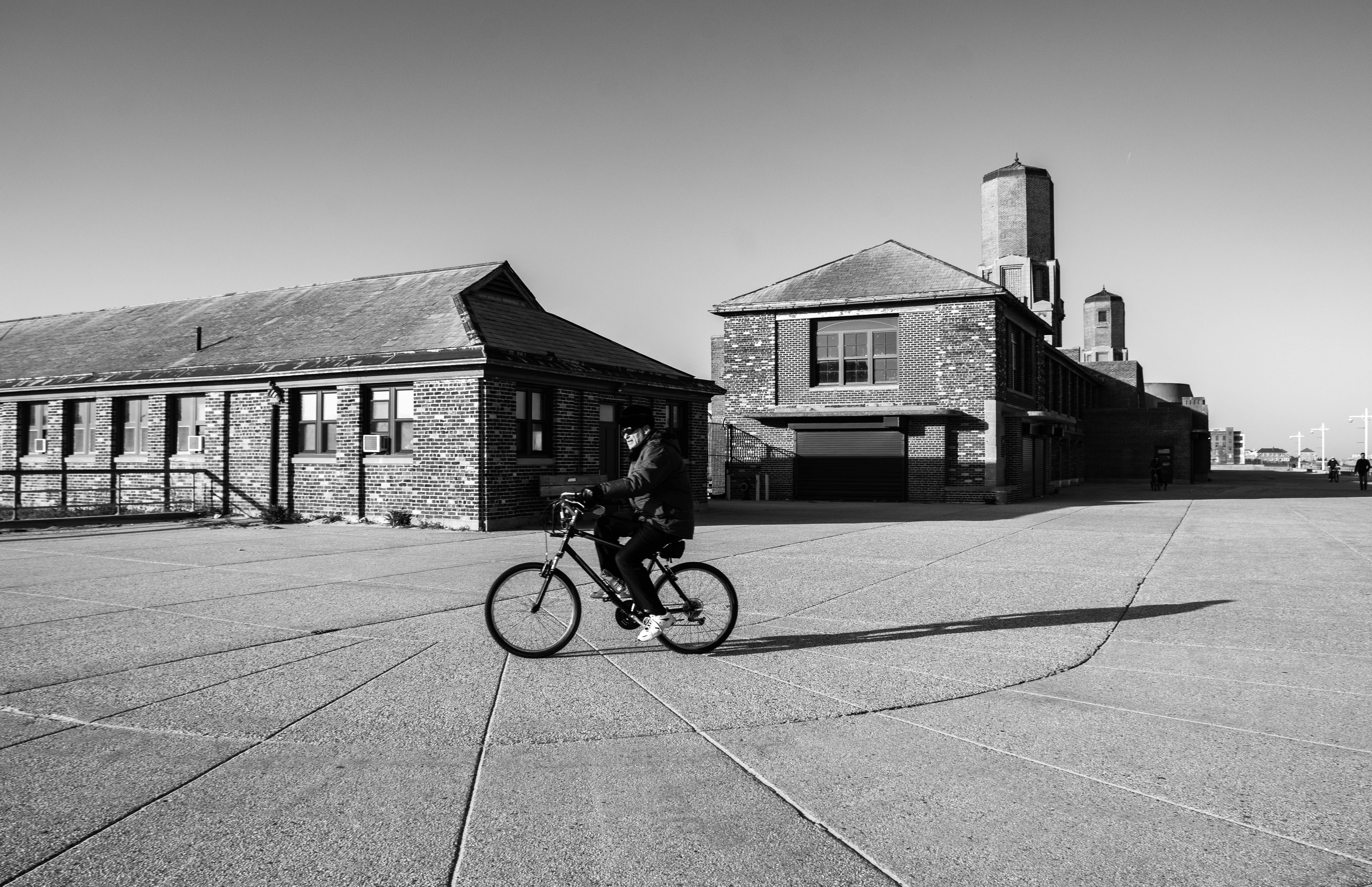 Cyclist in a Silent Brick Factory Yard