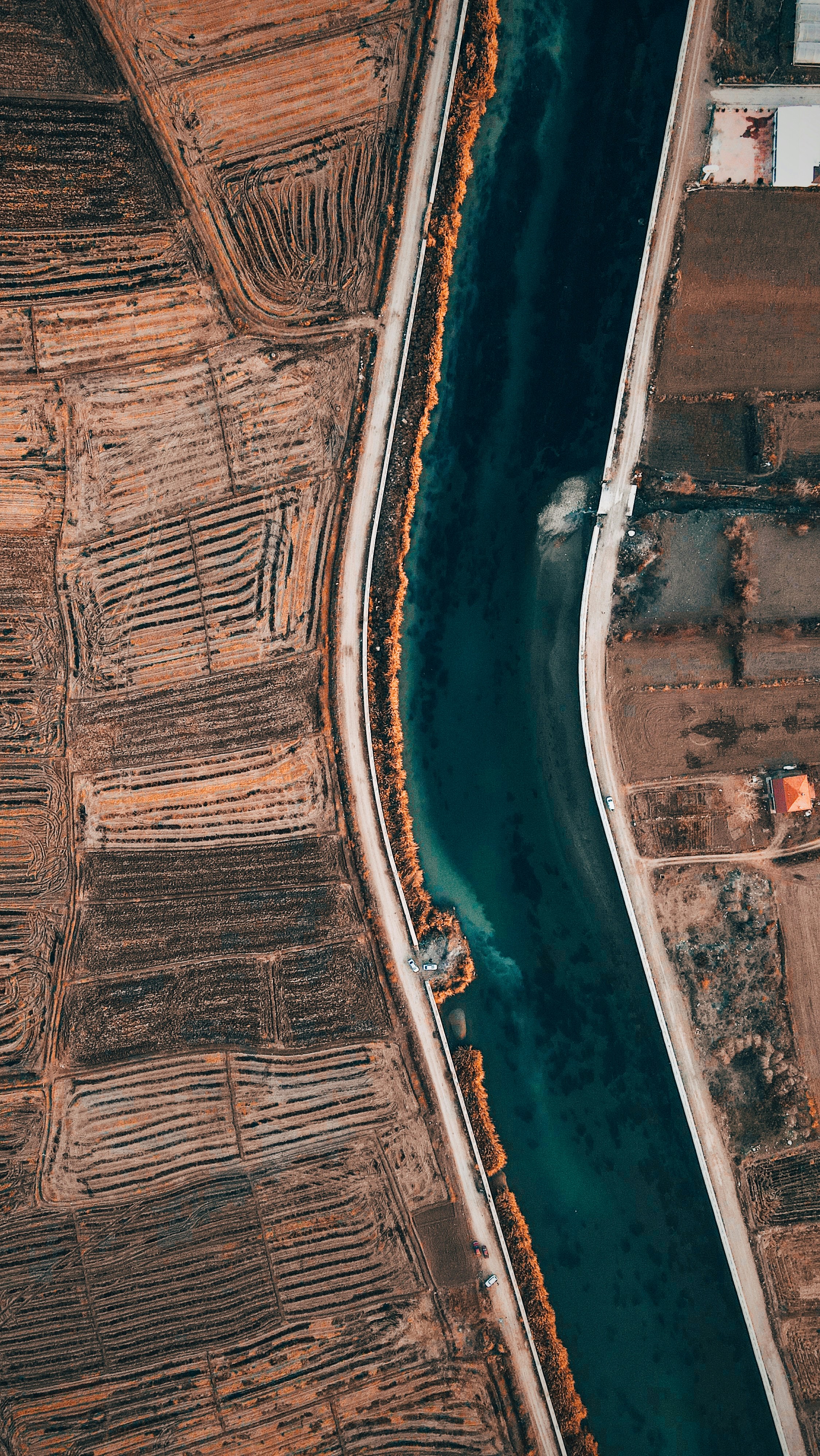 Cerulean Channel Cutting Through Parched Fields