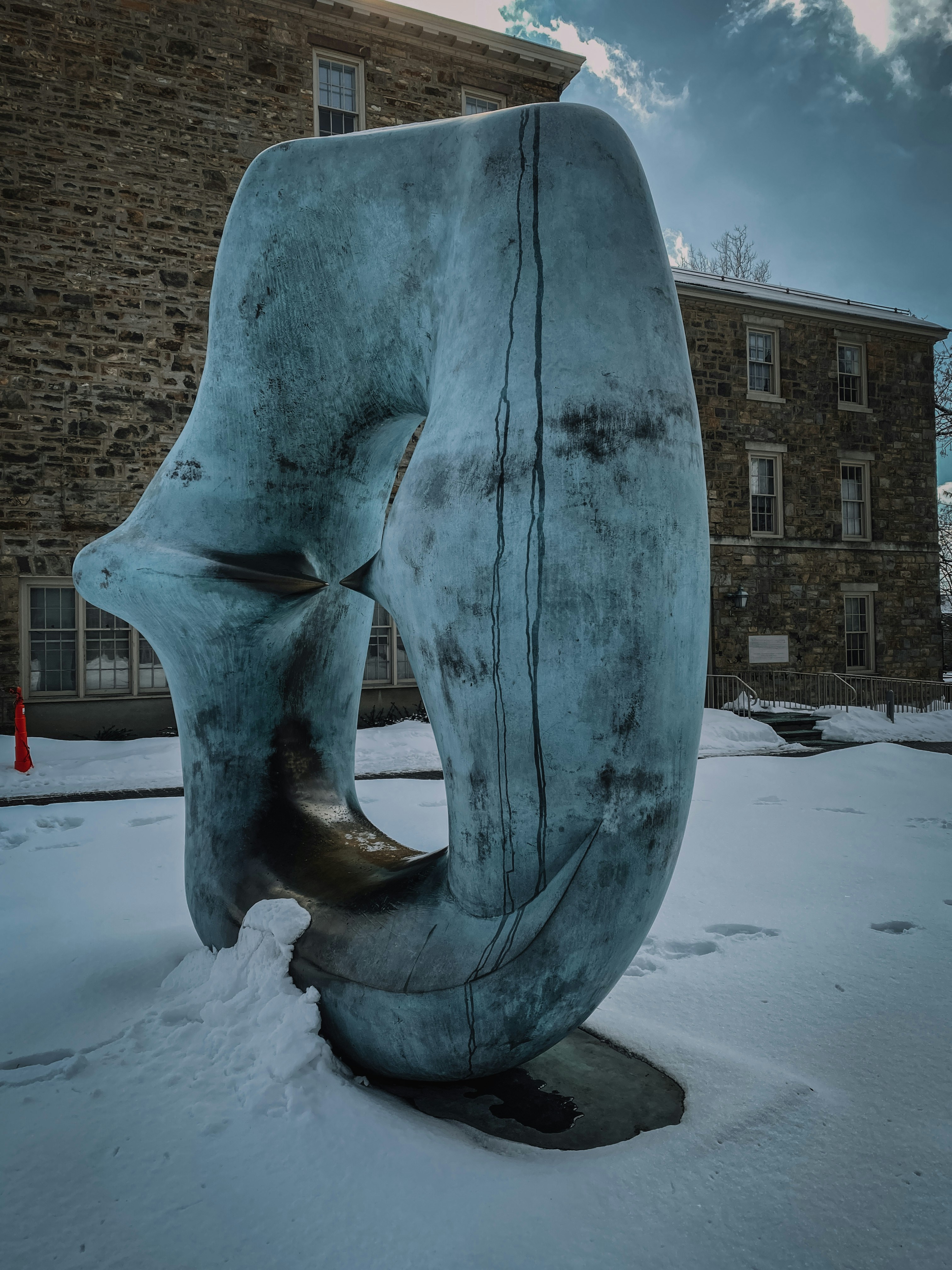 Frozen Blue Ring in a Snow-Dusted Courtyard