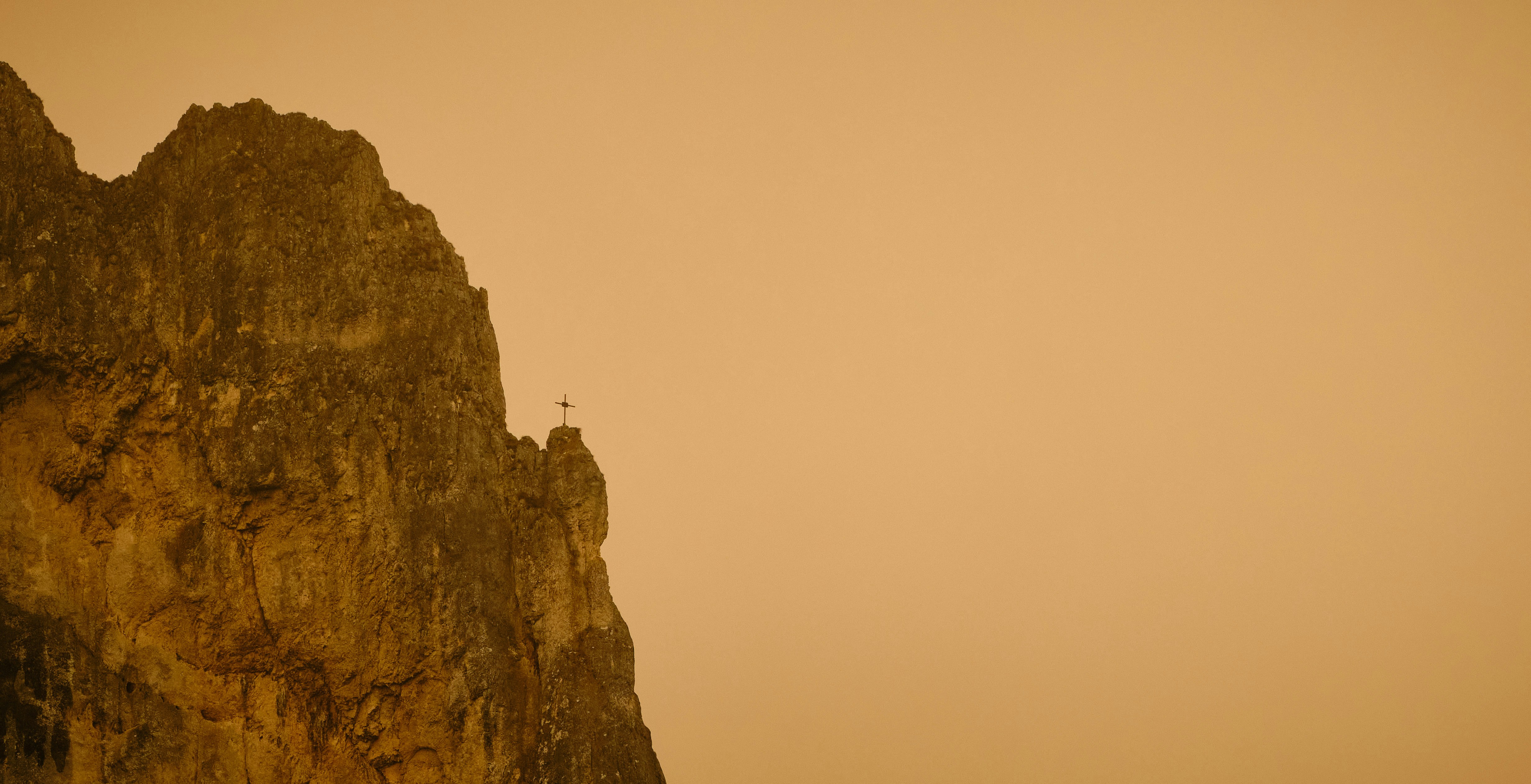 Rim of Silence: A lone spire against a copper sky