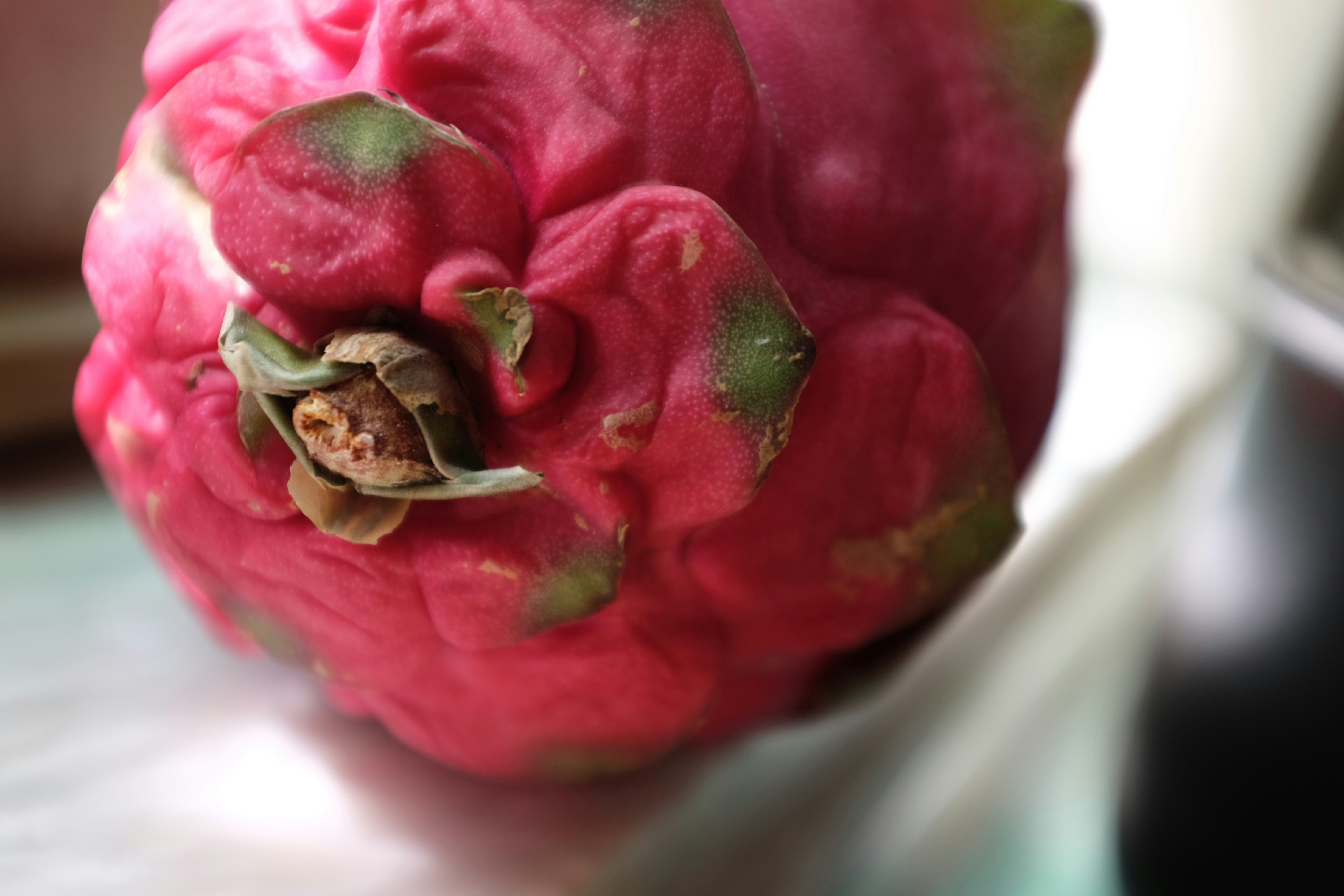 Crimson Dragonfruit Close-Up: Velvet Texture and Subtle Blur