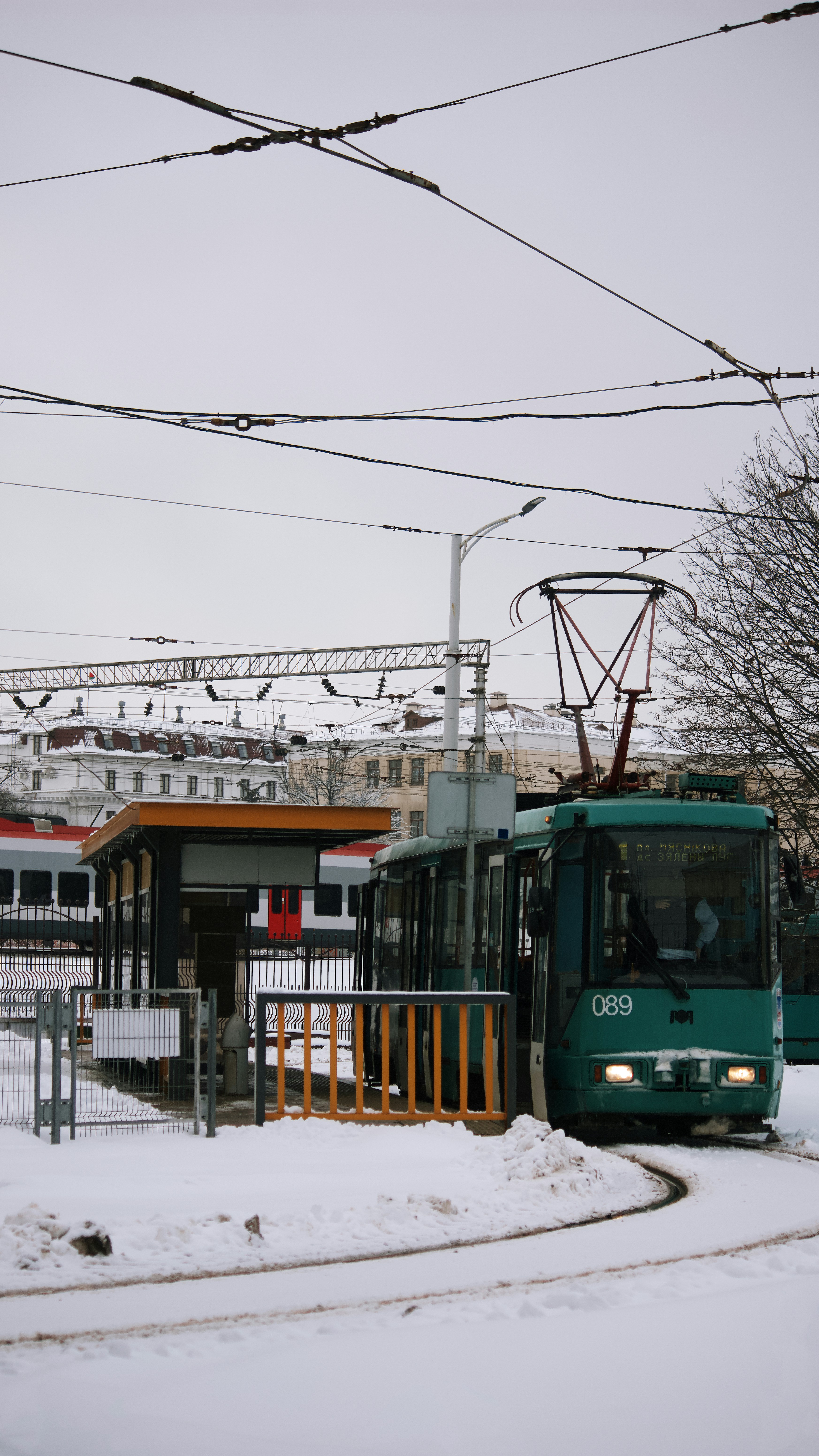 Urban Transit Amidst a Winter WonderlandSlava Taukachou