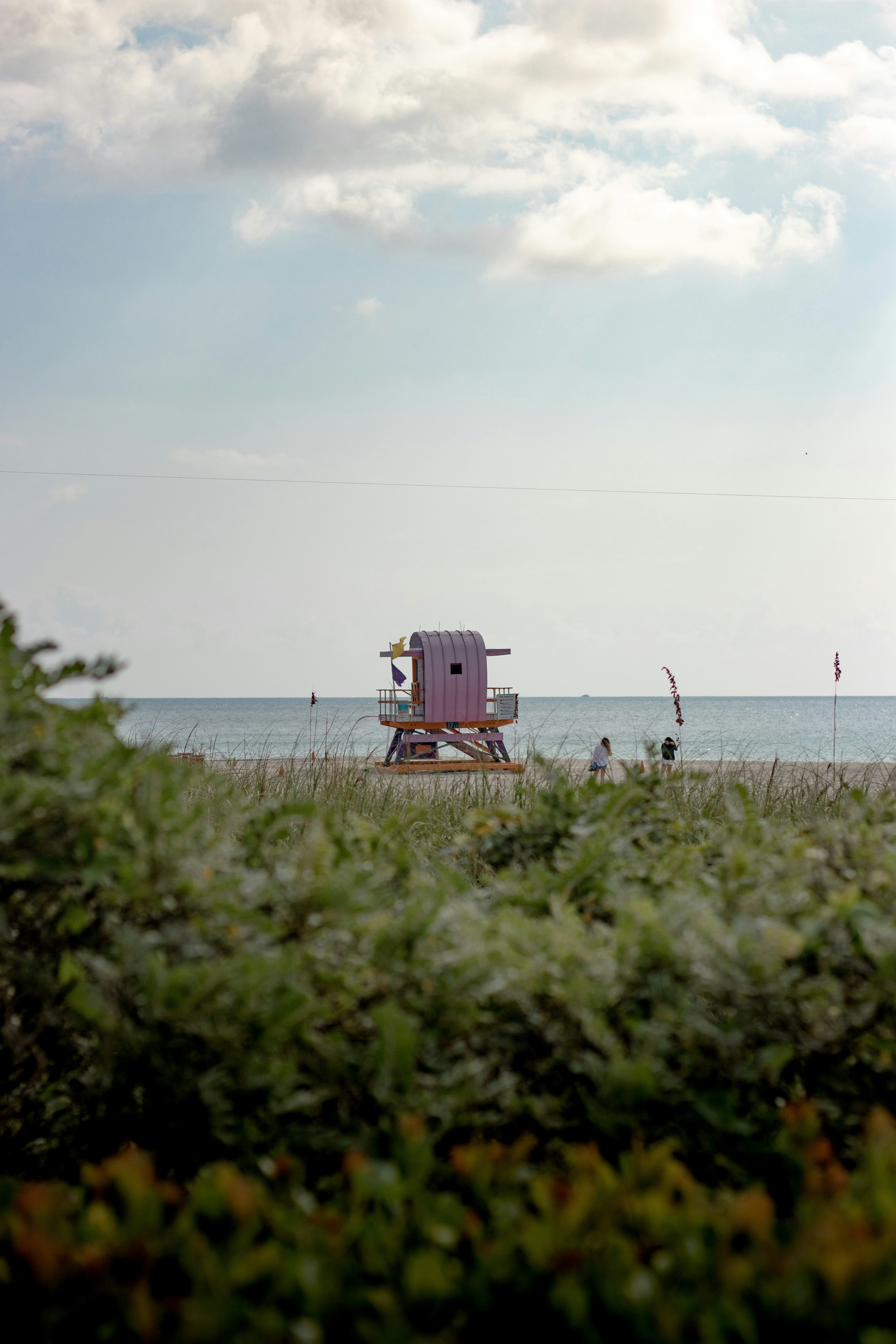 Purple Lifeguard Shack on a Quiet Beach