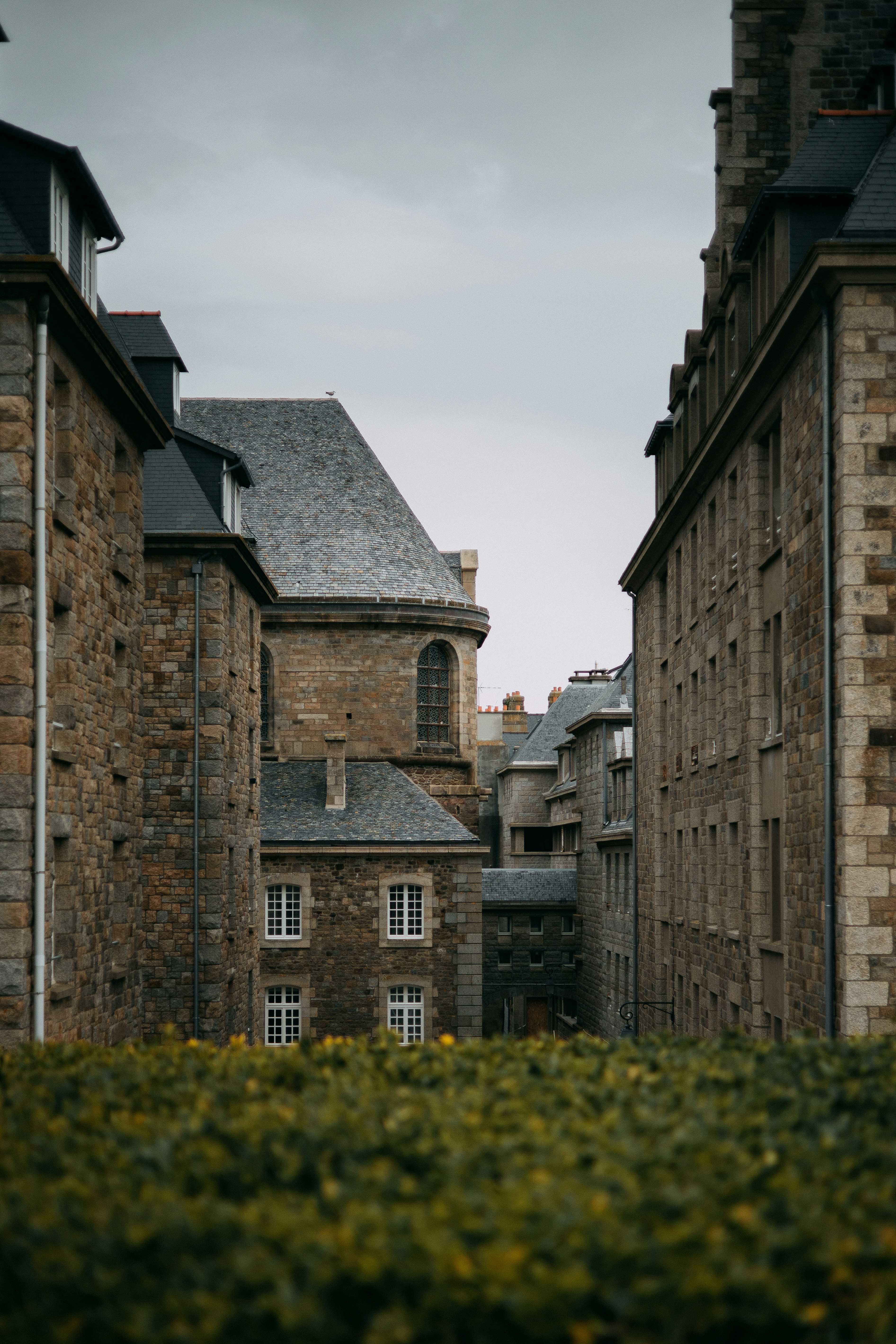 Between Stone Giants: a quiet corridor of weathered towers