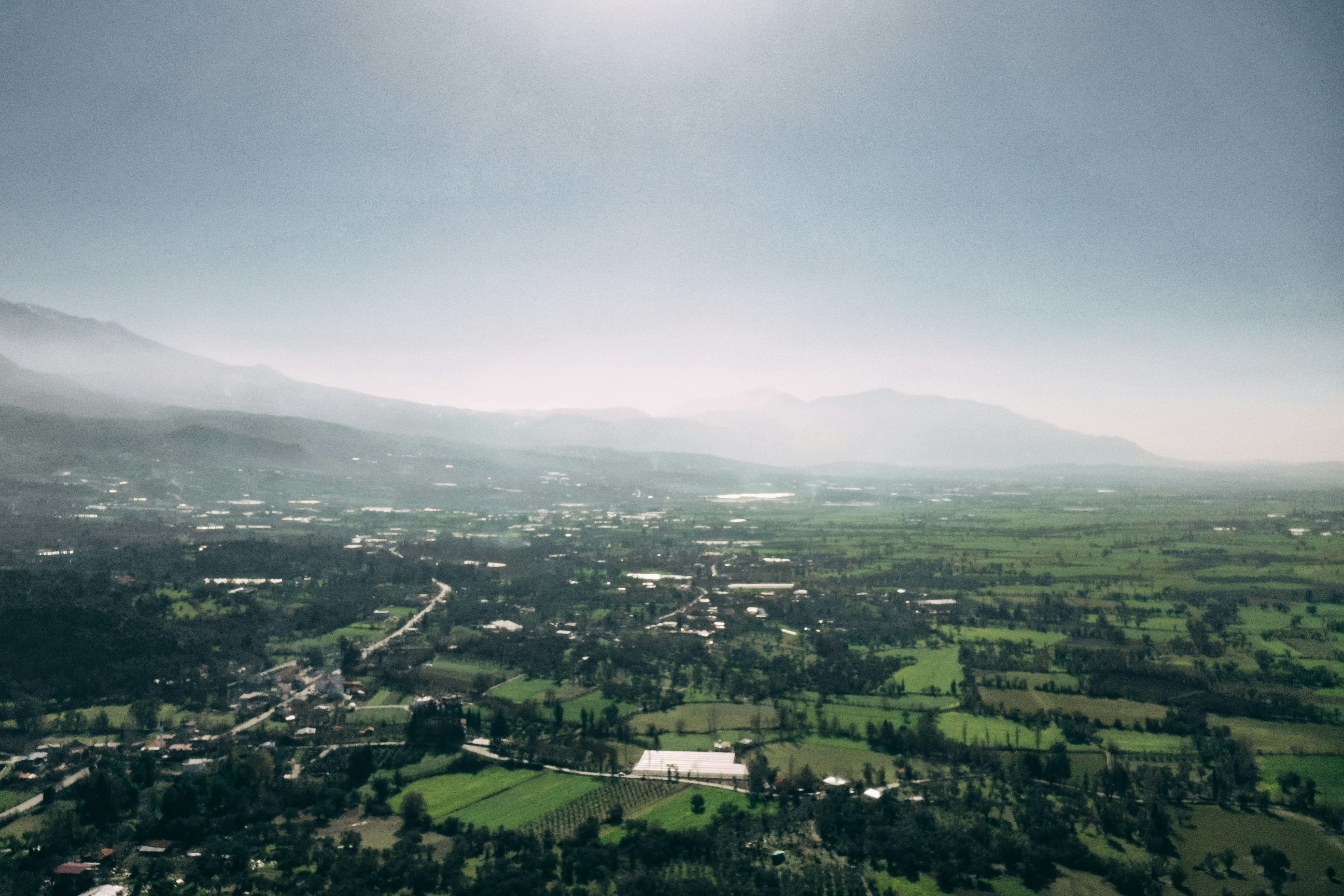 Aerial Veil over Emerald Plain