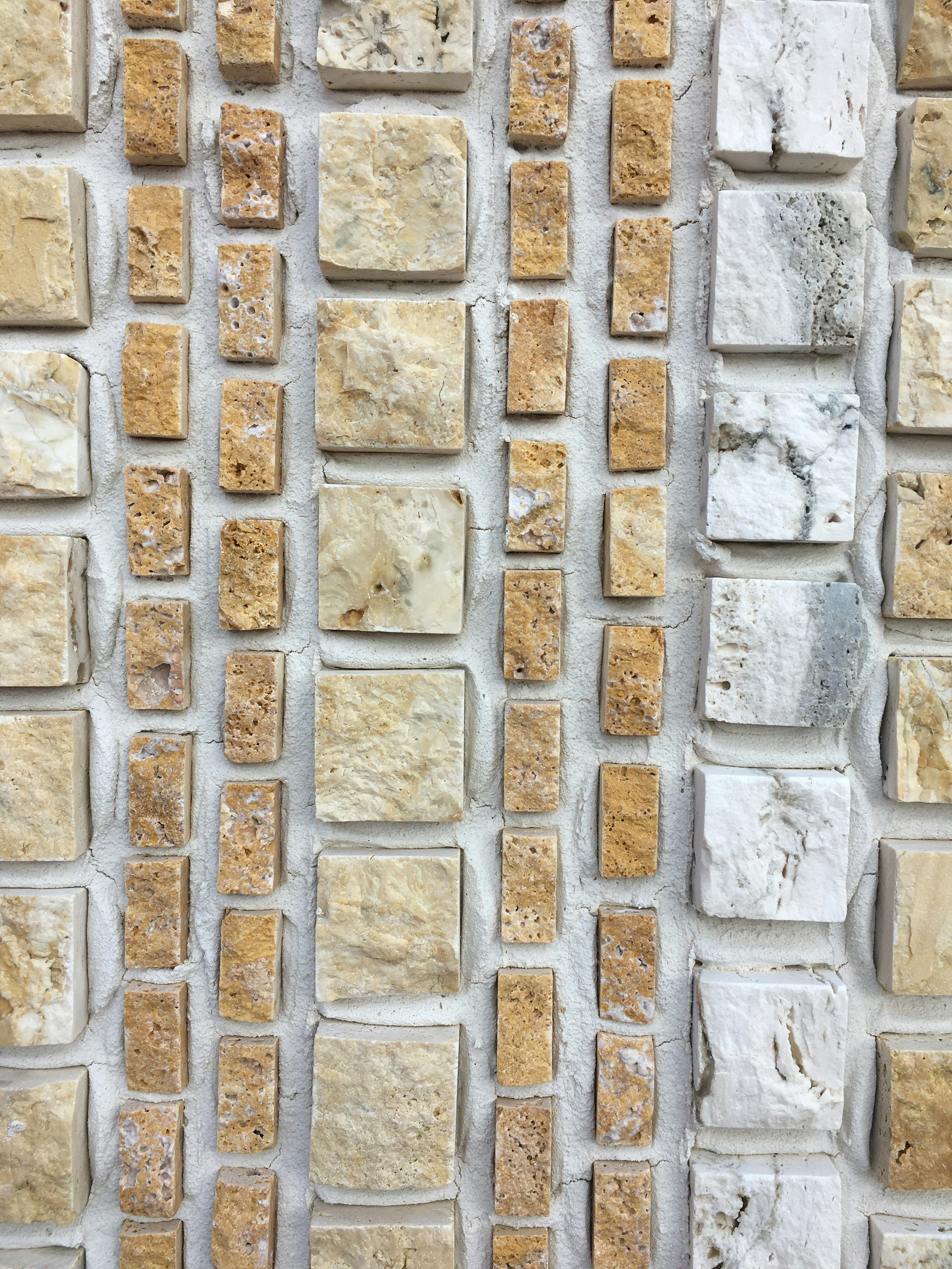 brown and gray brick wall