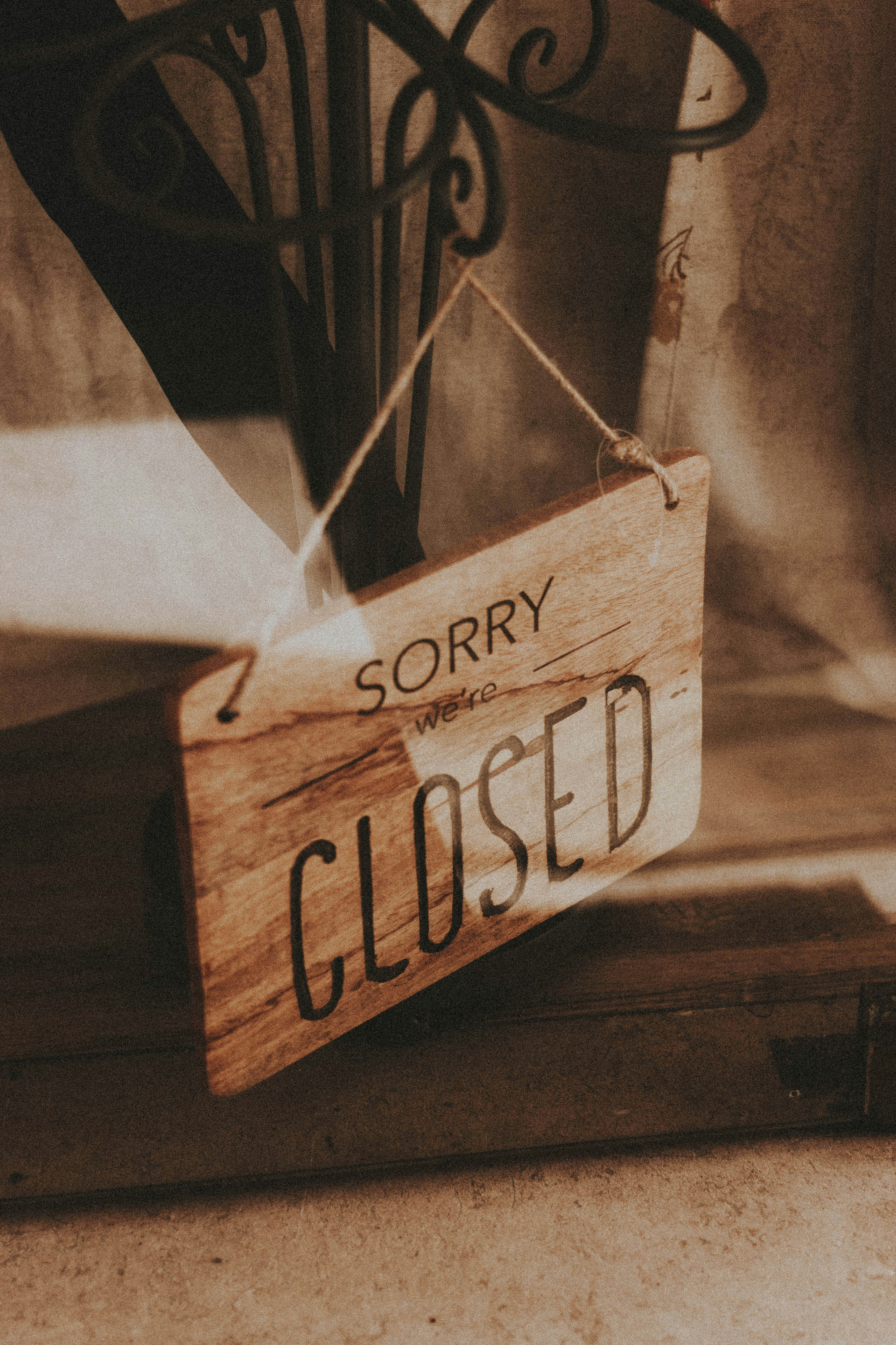 Closed Sign Echoes Quiet Shopfront