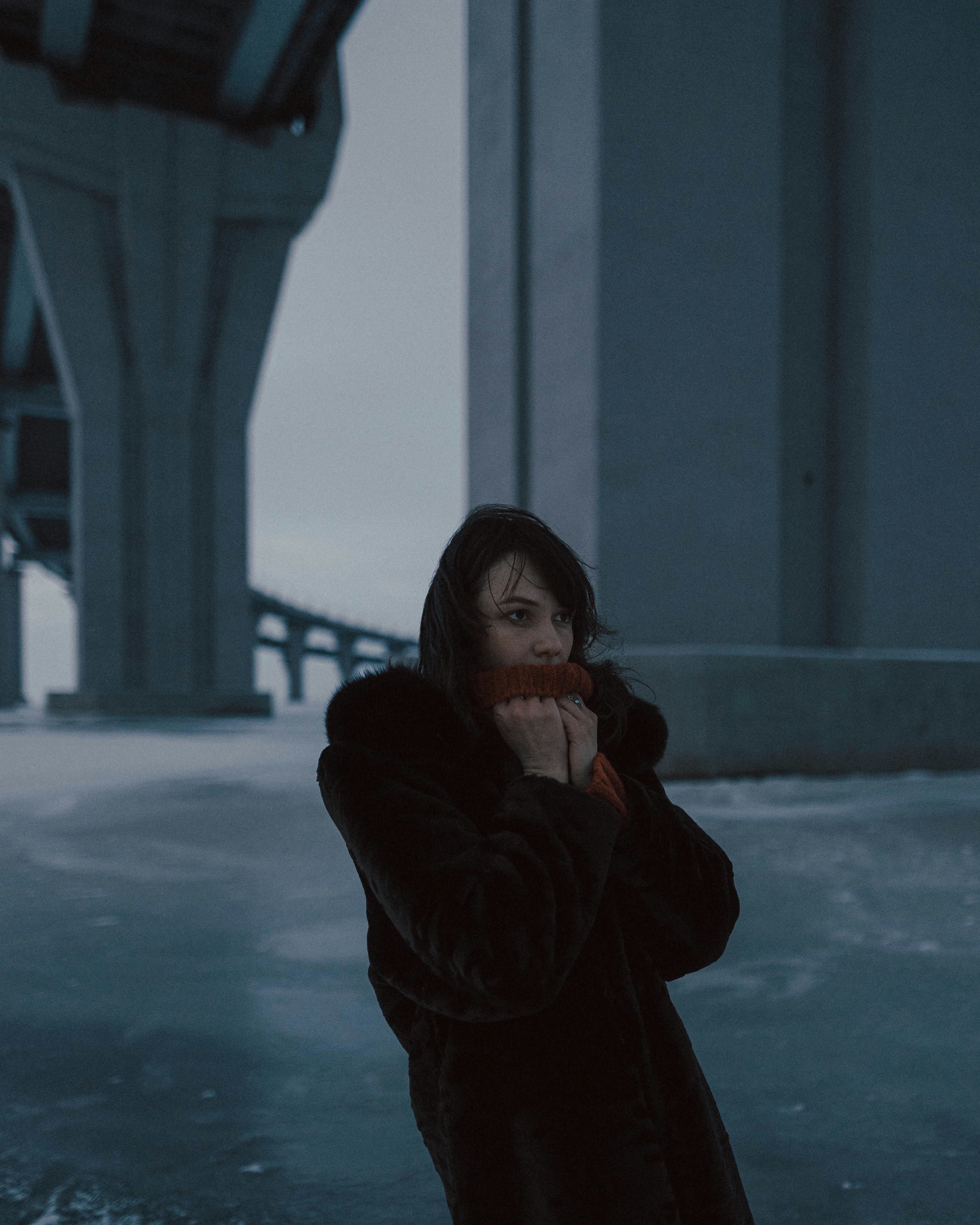 Arina trying to warm up staying at the middle of frozen lake