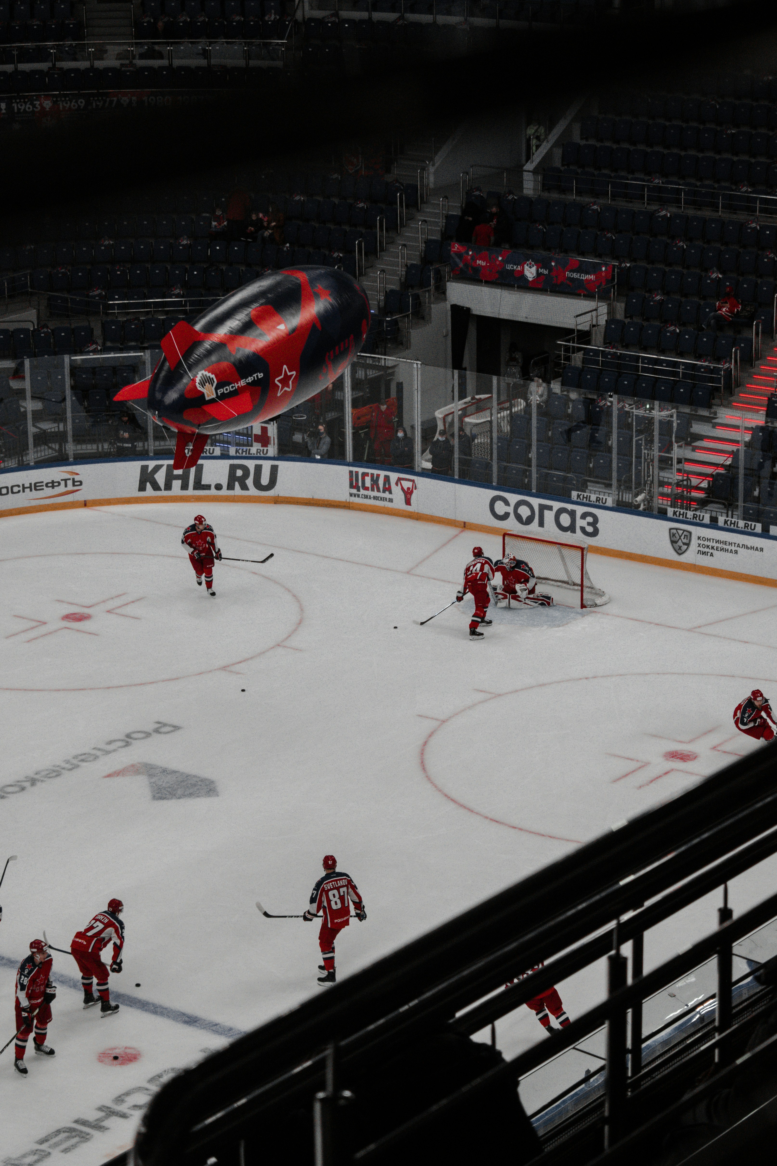 Red Zephyr Over CSKA Arena: An airborne airship crowns the ice