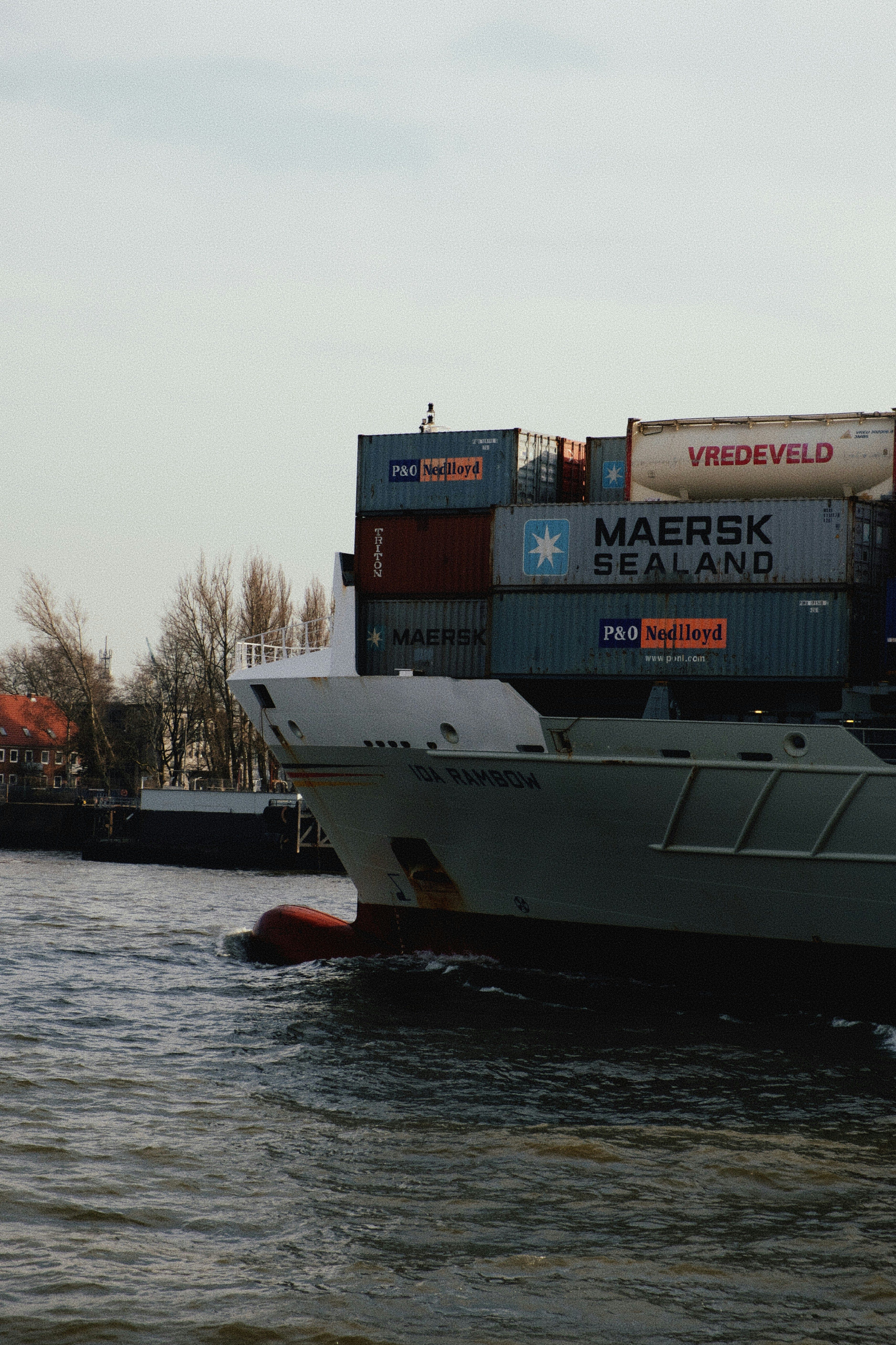 Container Towers Riding the Wake: A Freight Ship Portrait