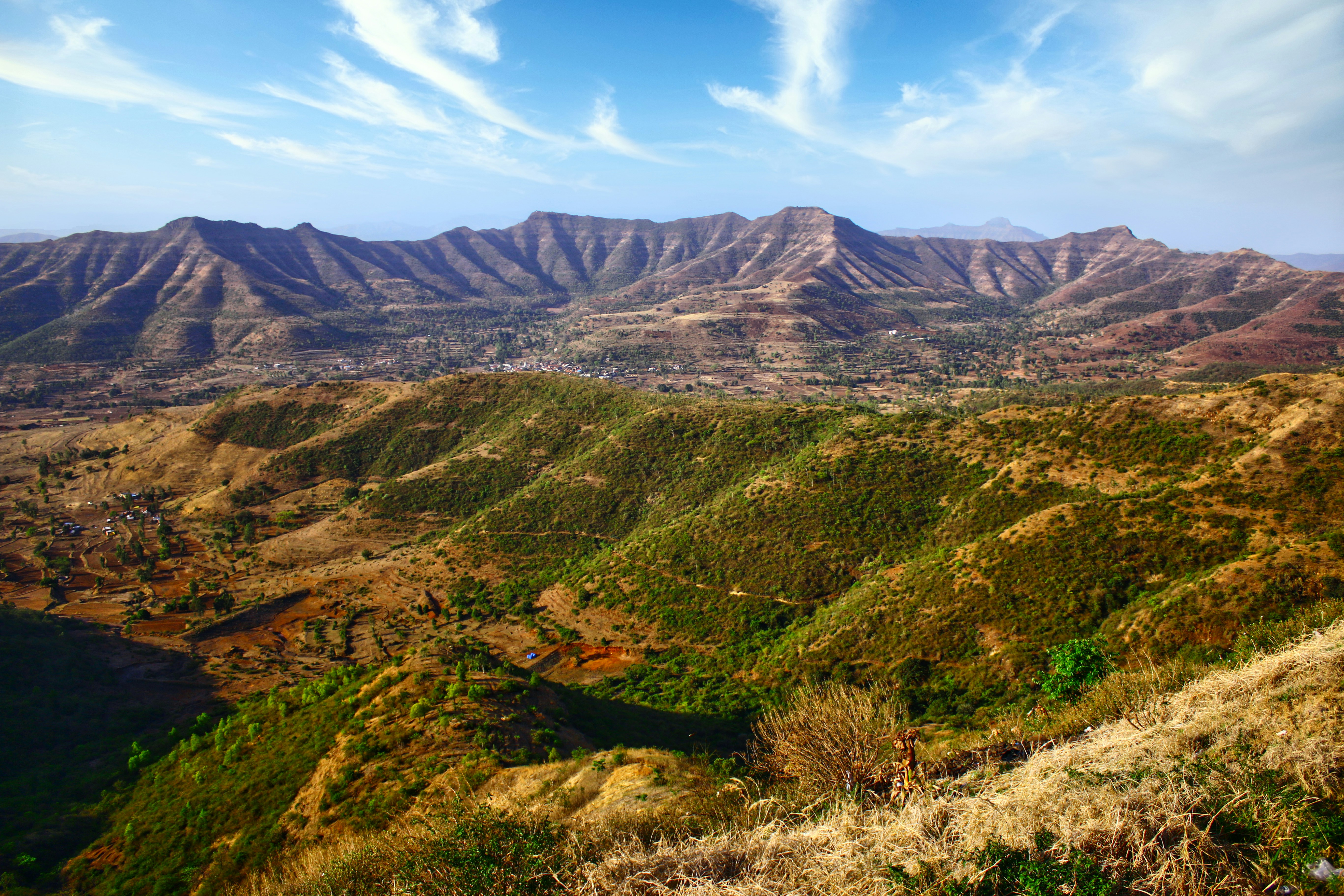 Green and brown mountains under blue sky during daytime photo – Free ...