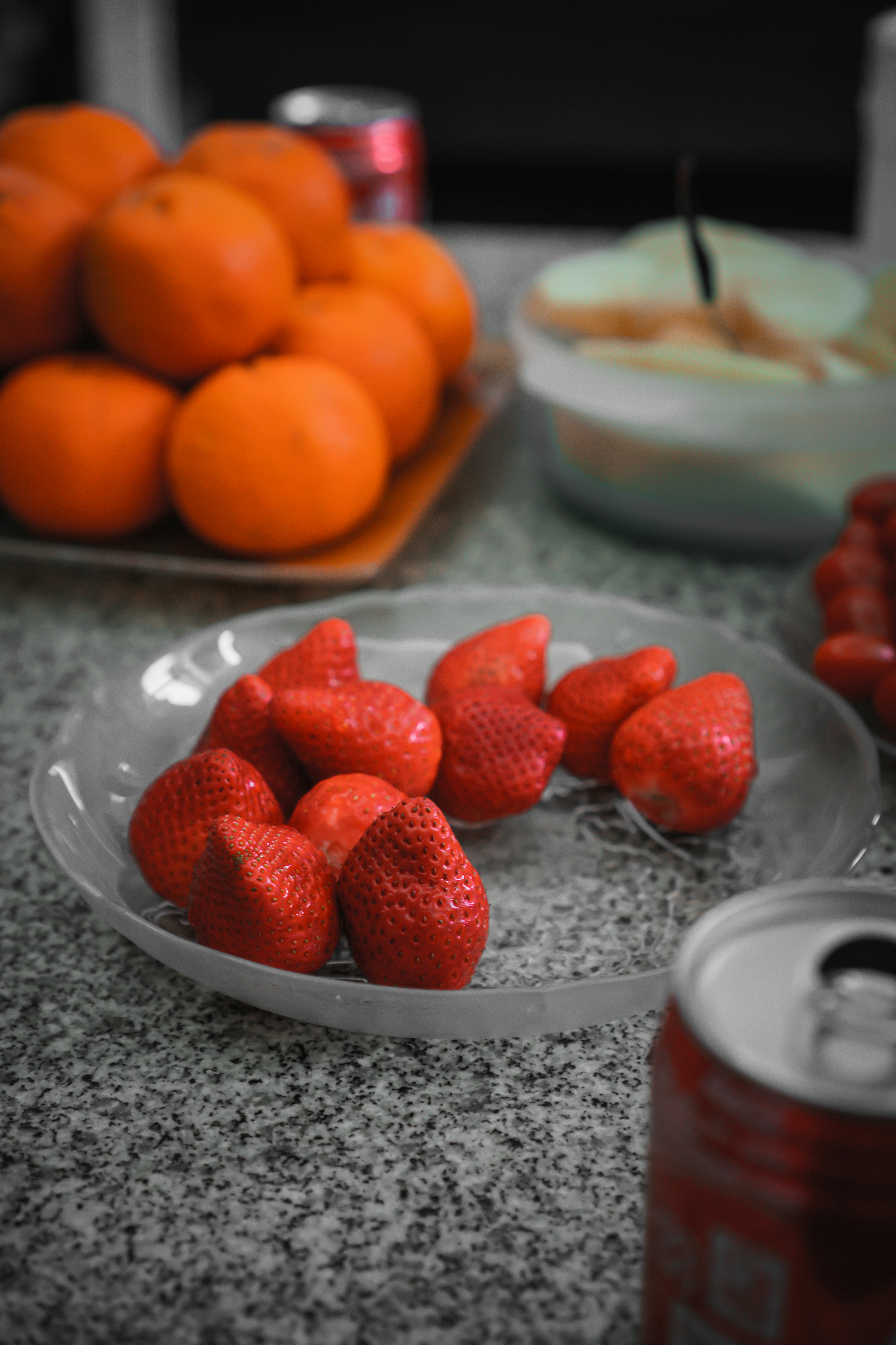 Strawberry Still Life on Granite: Vibrant Reds in Soft Focus