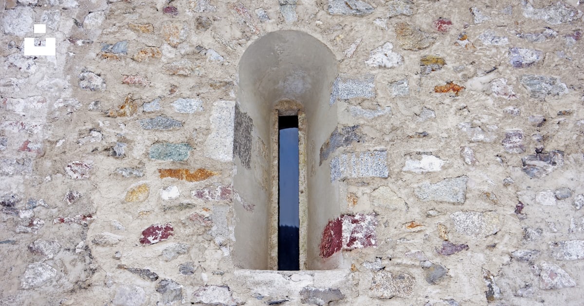 白と茶色のコンクリートの壁の写真 Unsplashの建物の無料画像