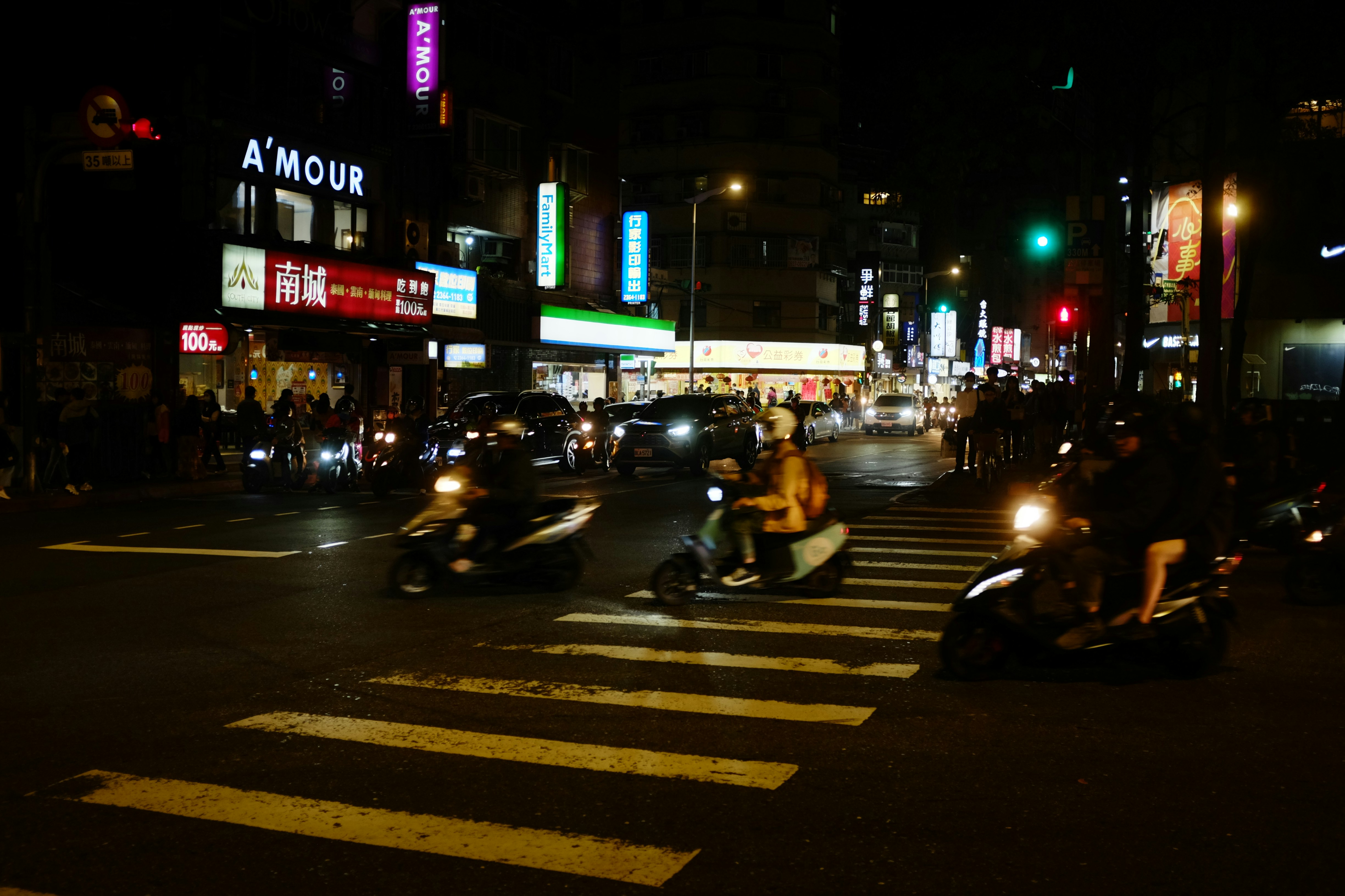 People riding motorcycle on pedestrian lane during night time photo ...