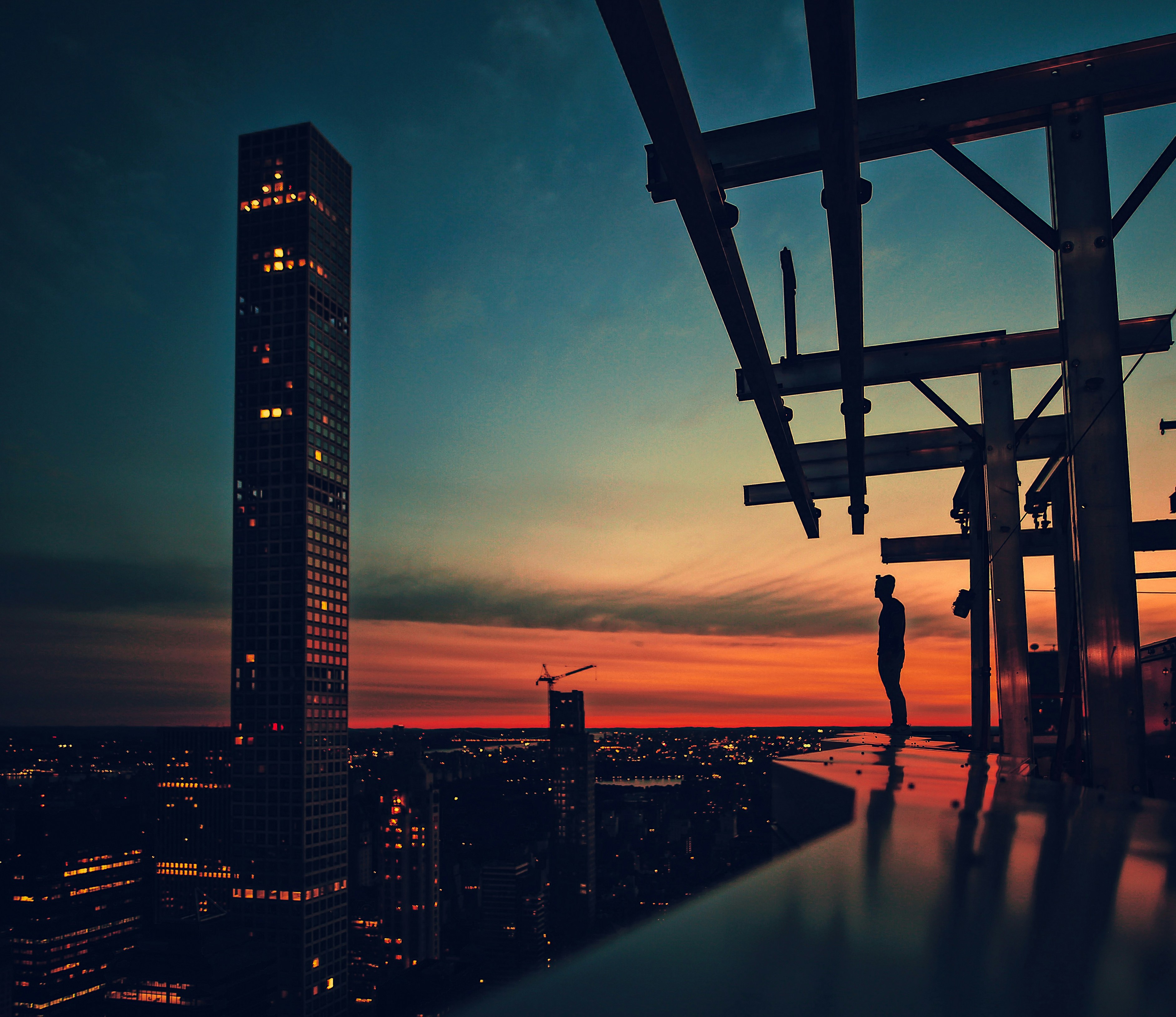 If you plan on posting to Instagram, please tag @a.curious.ape

Otherwise, feel free to use it as you please :) | silhouette of man standing on bridge during night time