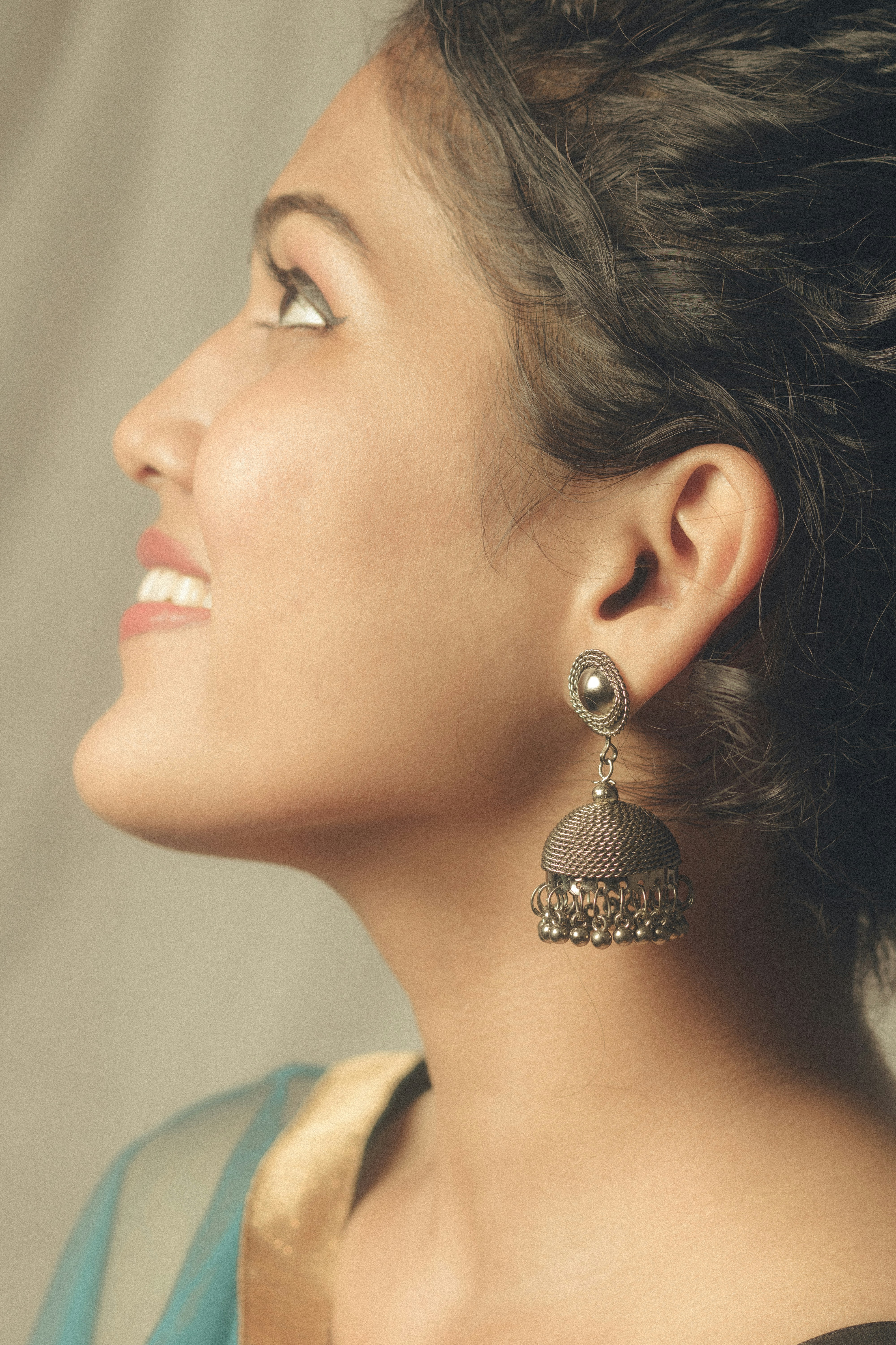 Amber Quiet: Profile Portrait with a Silver Jhumka