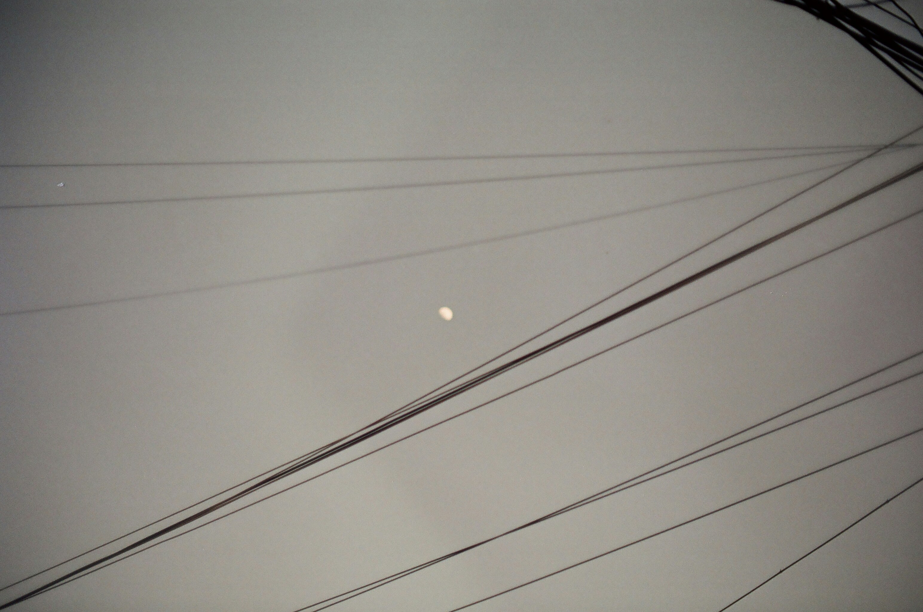 Celestial Interlude Amidst Urban Lines