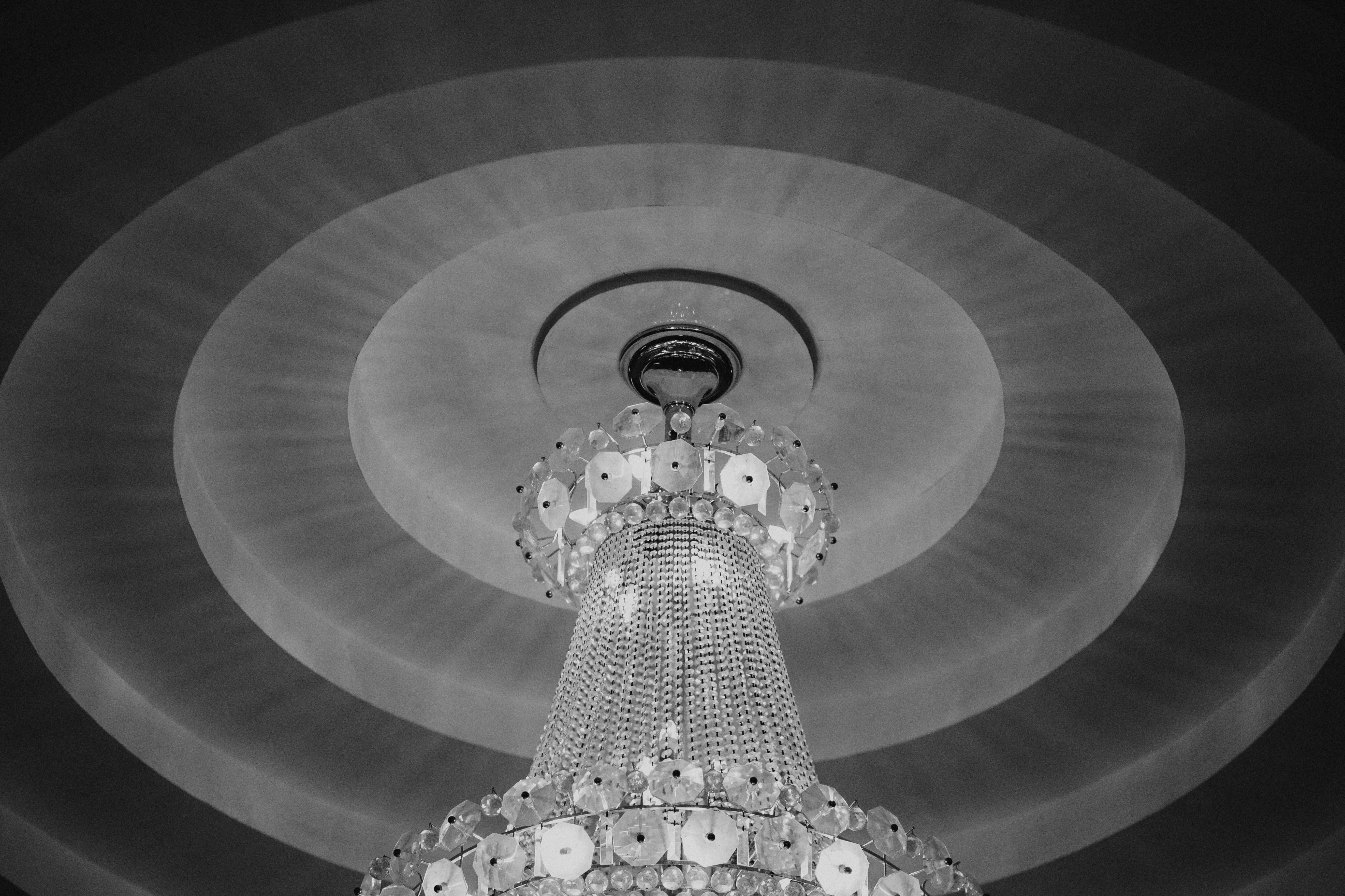 Crystal Halo: A Chandelier Surrounded by Concentric Light Rings
