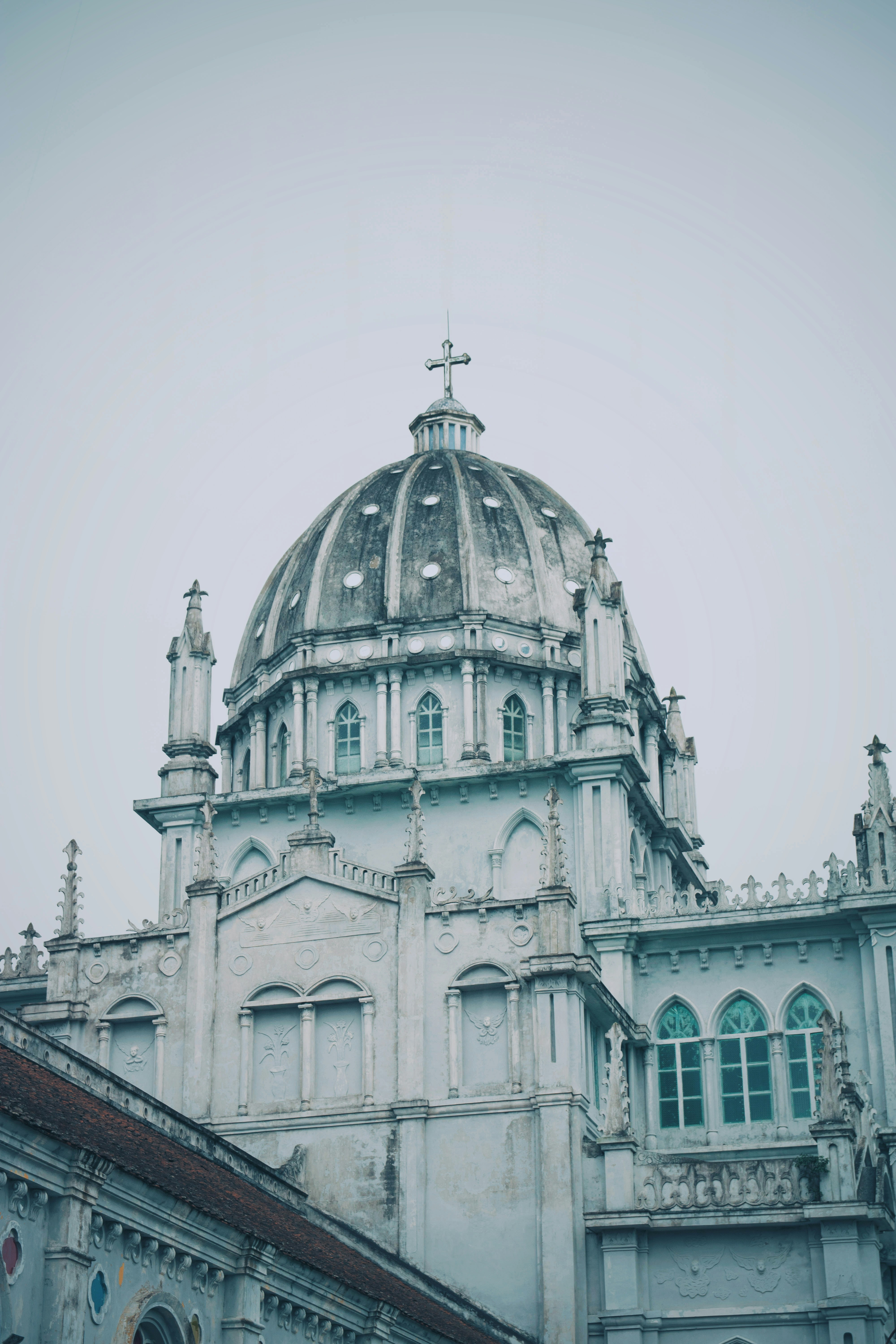 Crowned in Ice: The Cathedral Dome Against a Pale Azure Sky