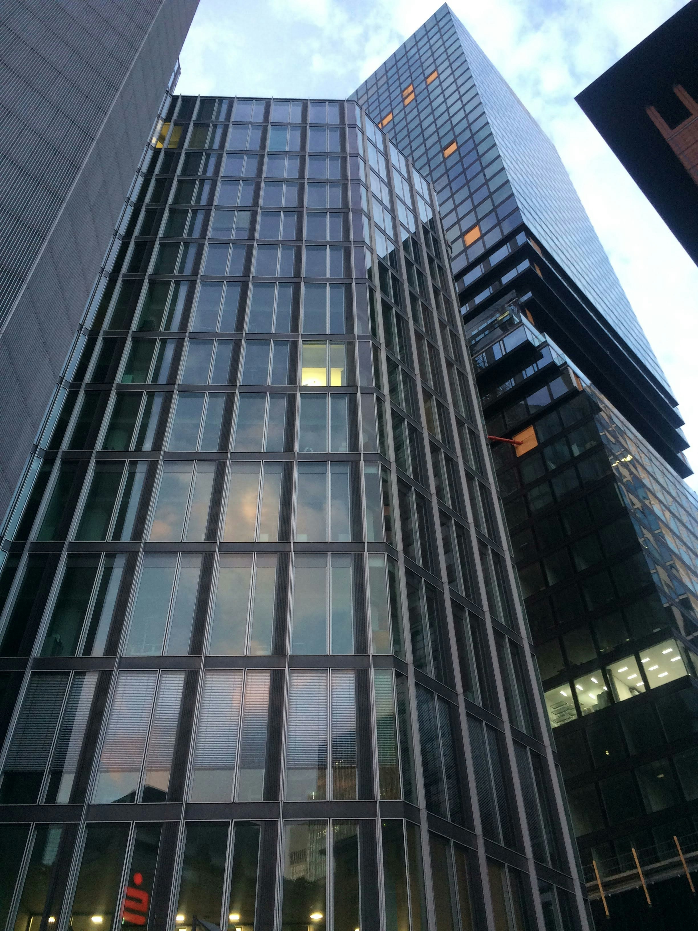 Low angle photography of glass walled high rise building photo – Free ...