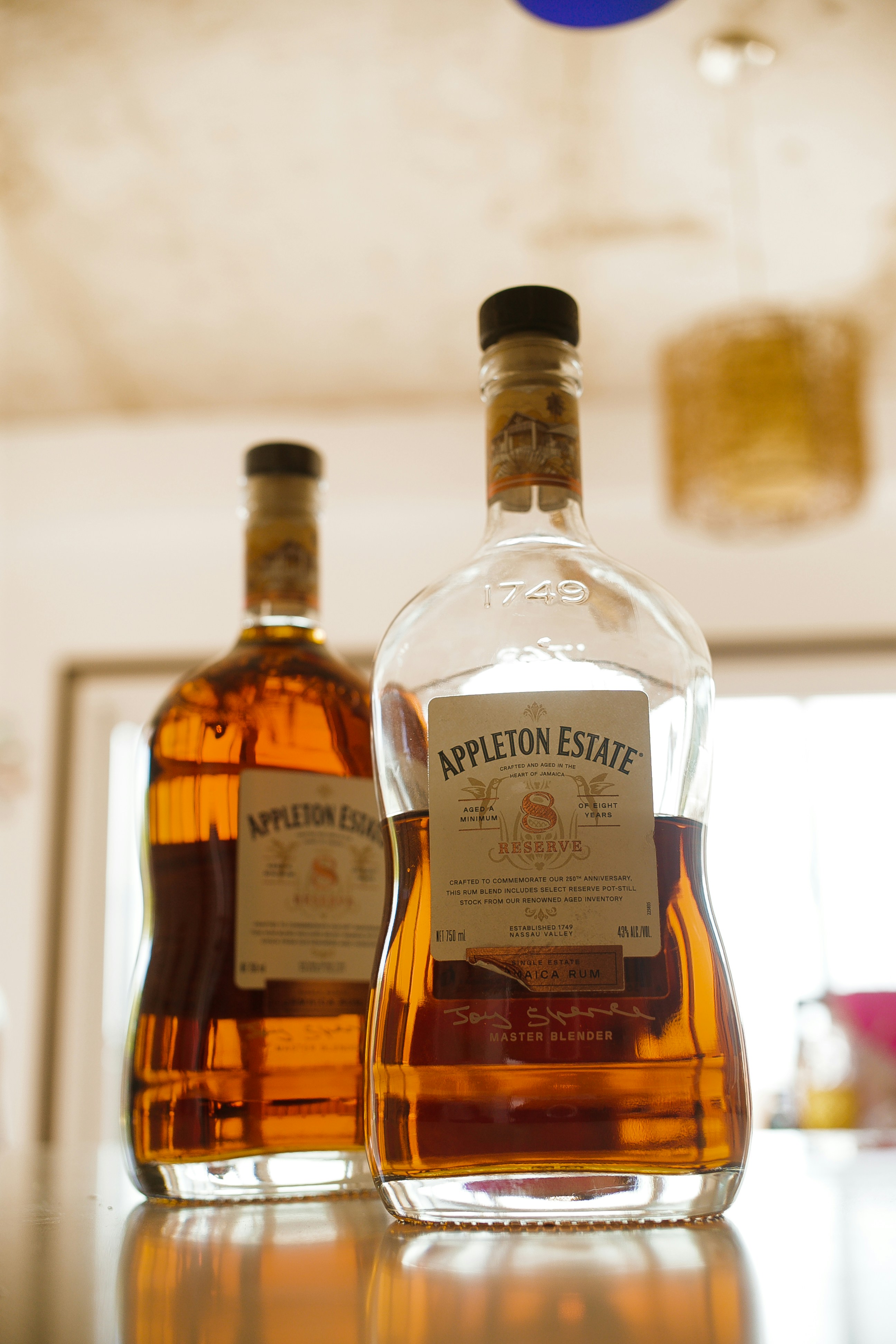 Amber Portrait: The Front Appleton Estate Bottle Amid Soft Bar Light