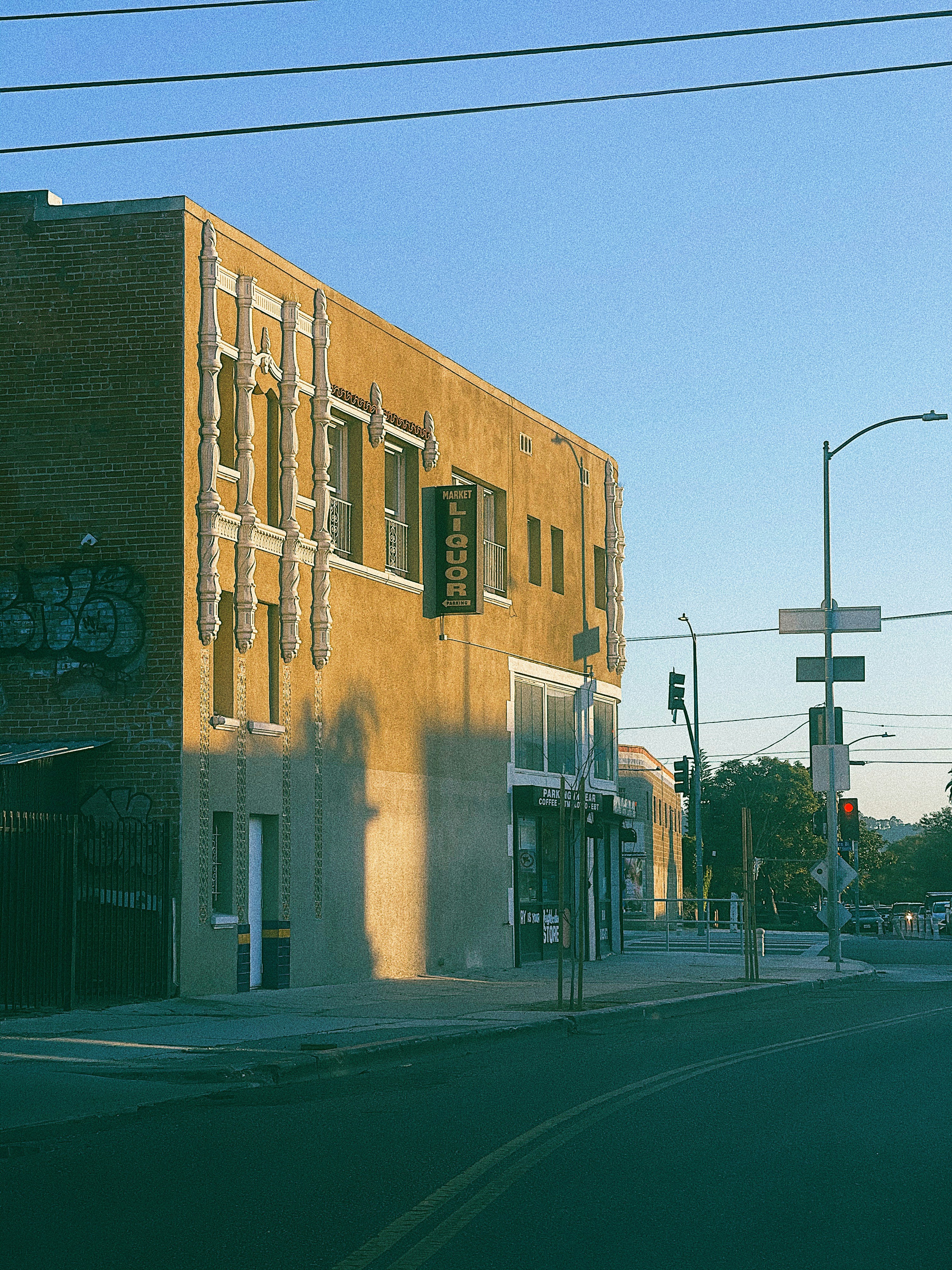 Brown concrete building near road during daytime photo – Free Road ...