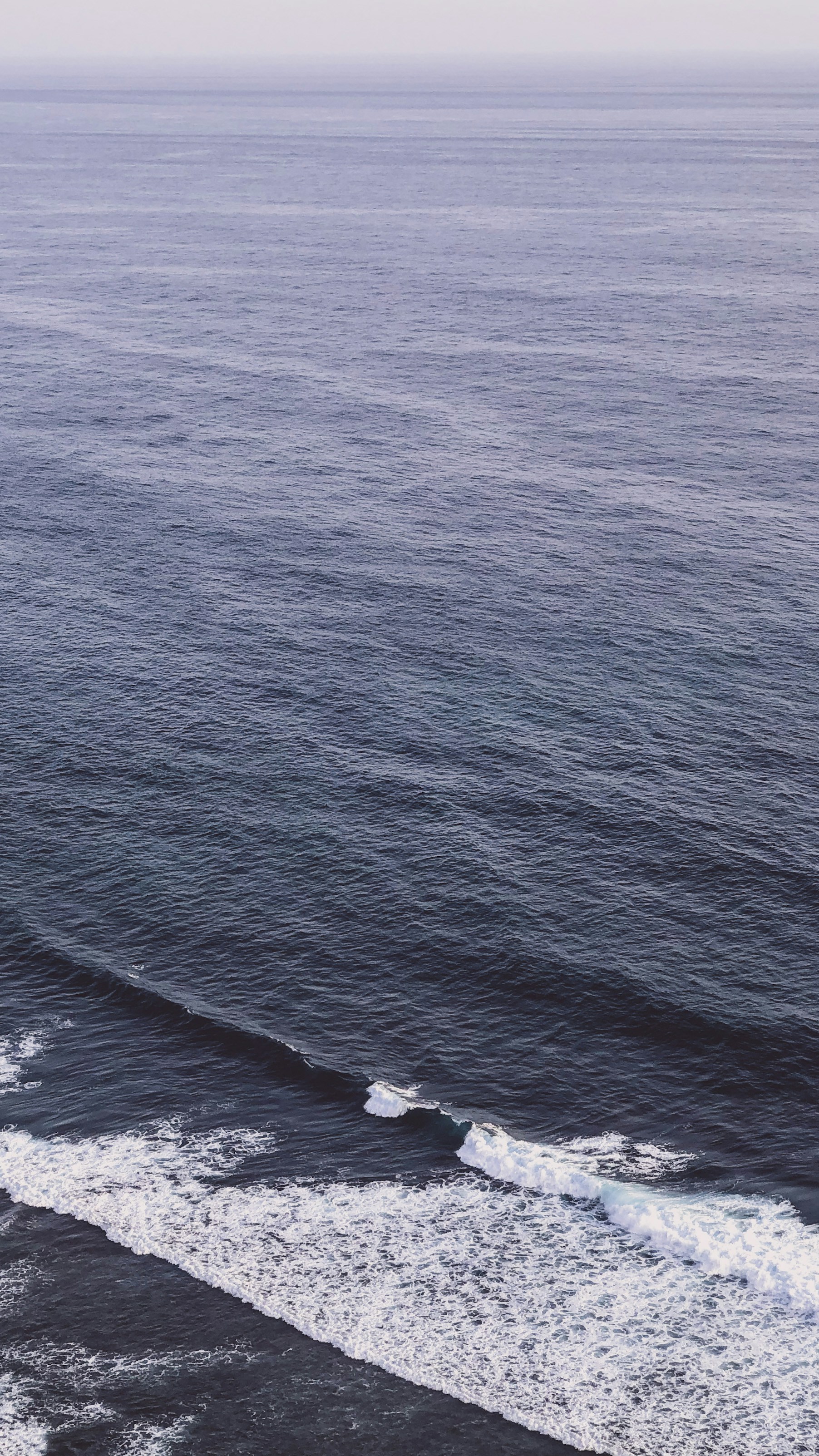 Foam-Lined Horizon: Vertical Ocean Rhythm