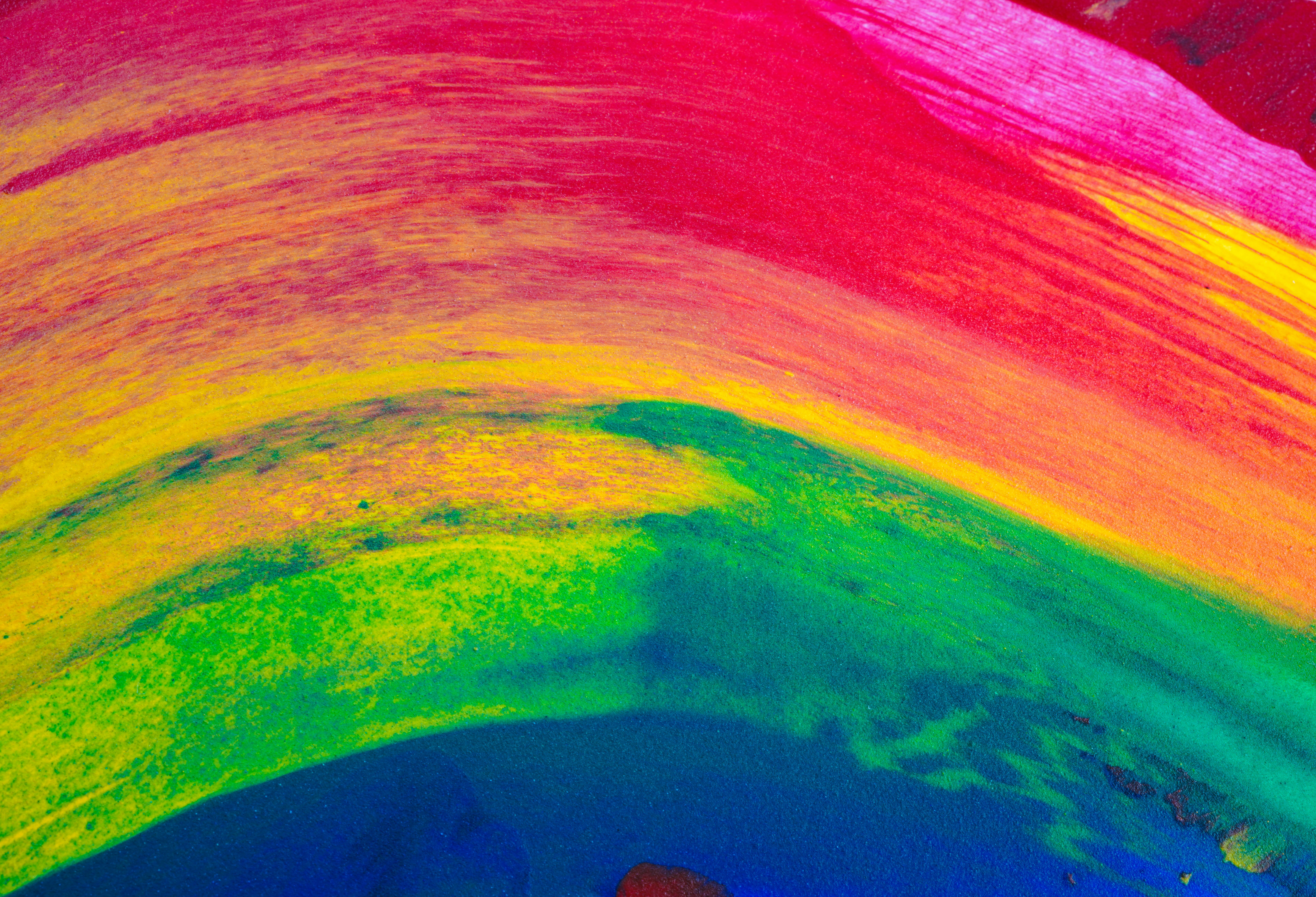 Abstract swirl of vibrant colors blending together, showcasing a dynamic interplay of hues. This artwork exemplifies the fluidity of artistic expression.