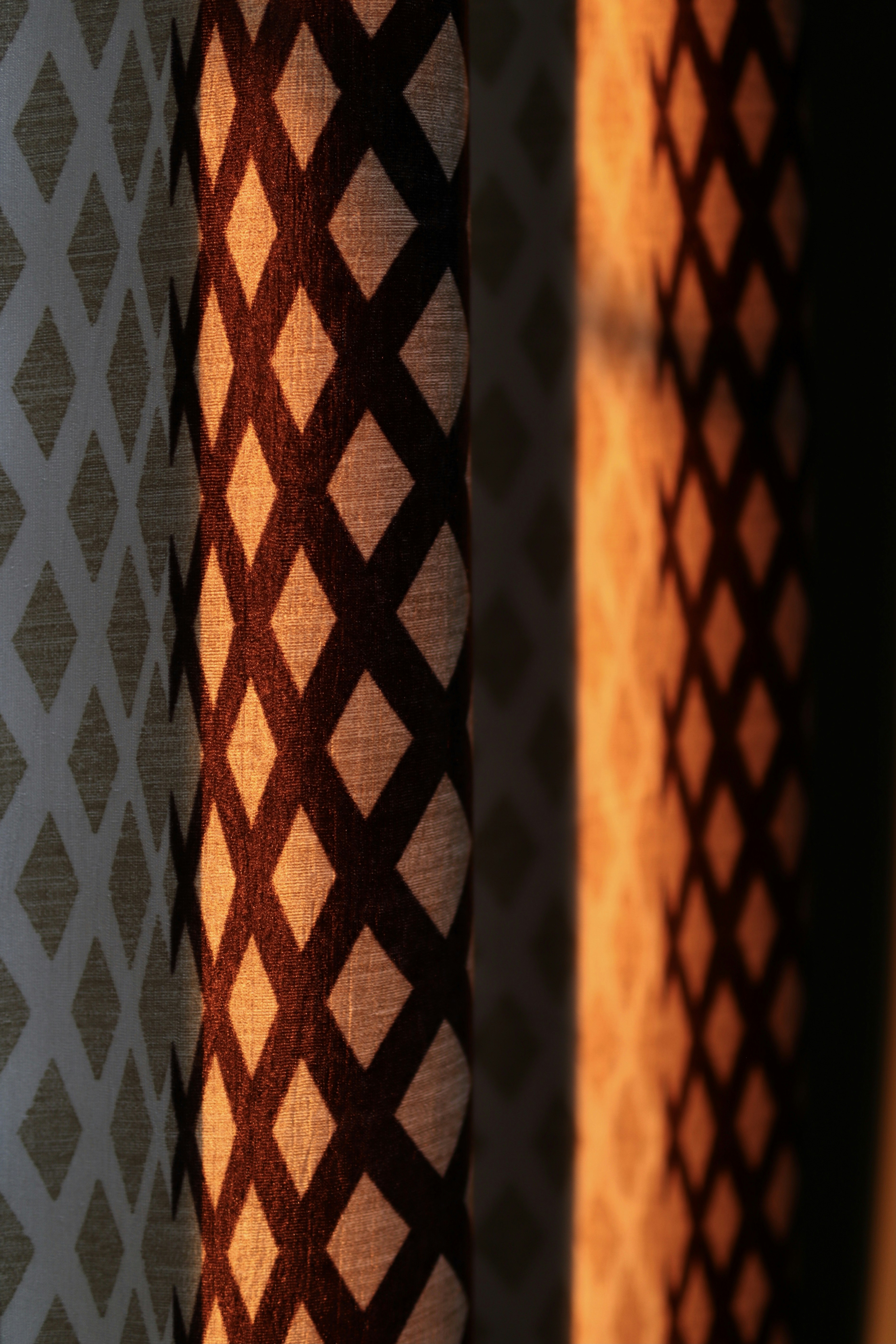 brown and black plaid textile