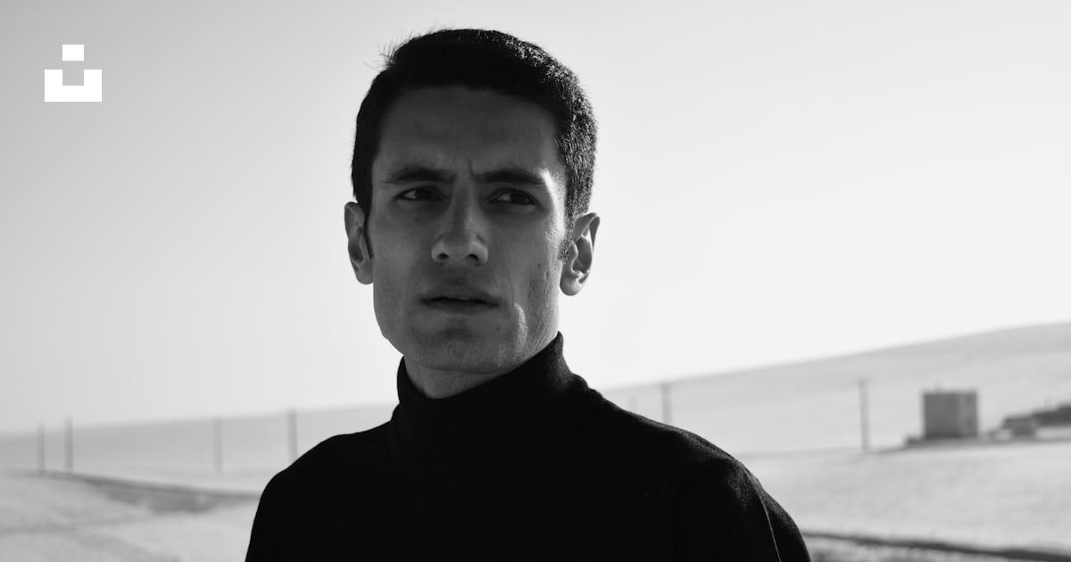 Man In Black Crew Neck Shirt Photo Free Person Image On Unsplash