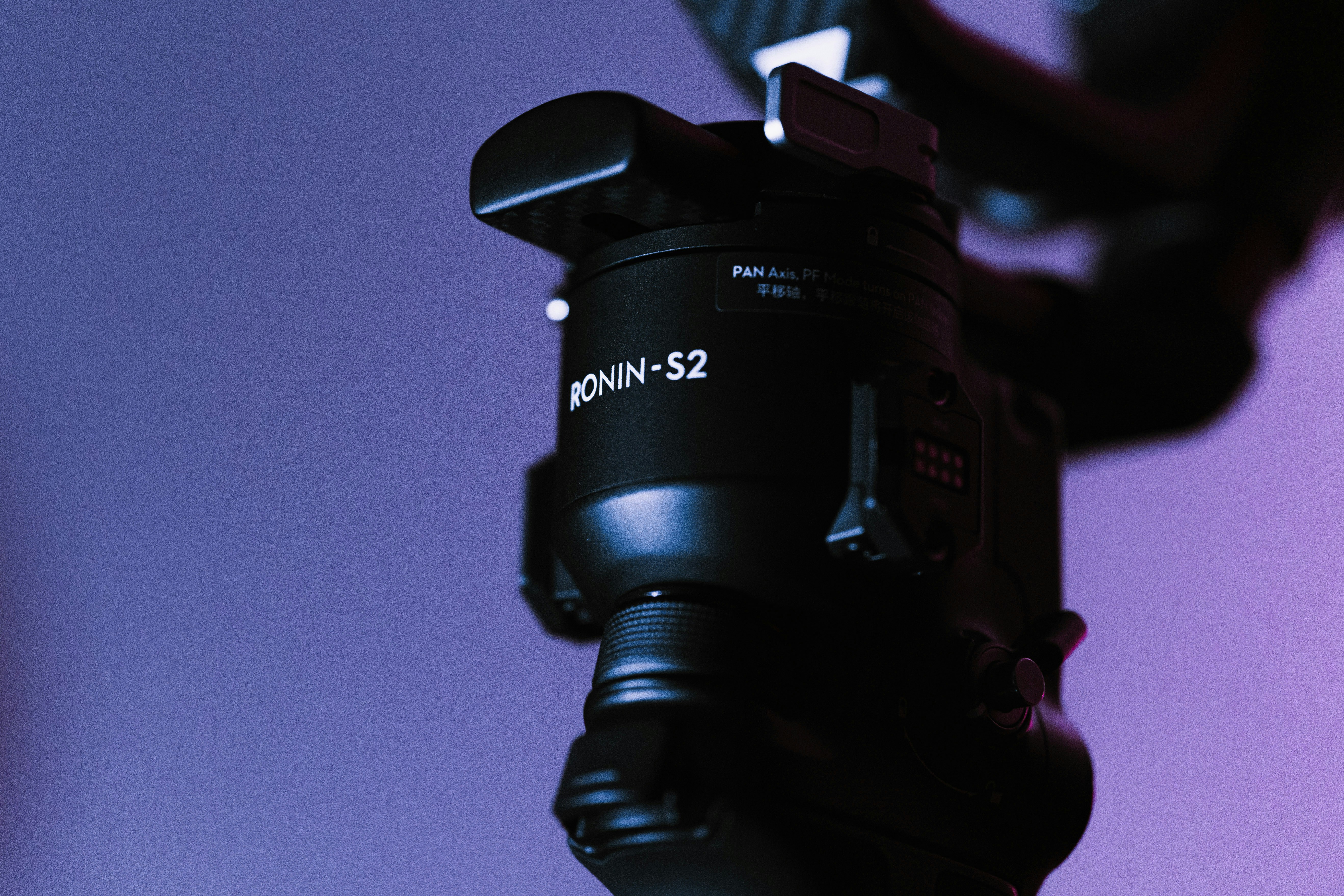 Black nikon dslr camera on brown wooden table photo – Free Videography ...