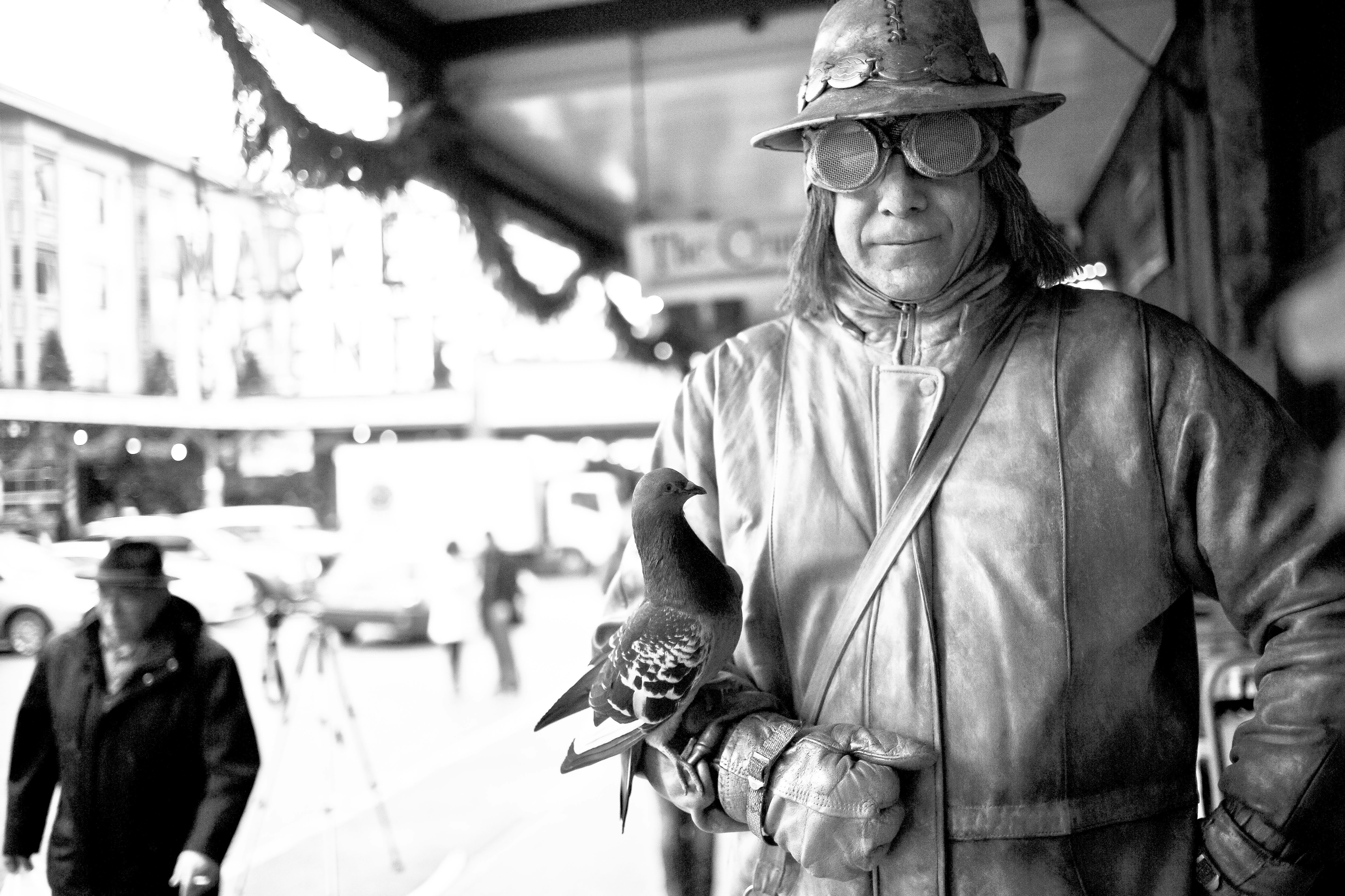 Harboring a Secret: A Street Portrait of a Mild-Madden Clad Pigeon Handler