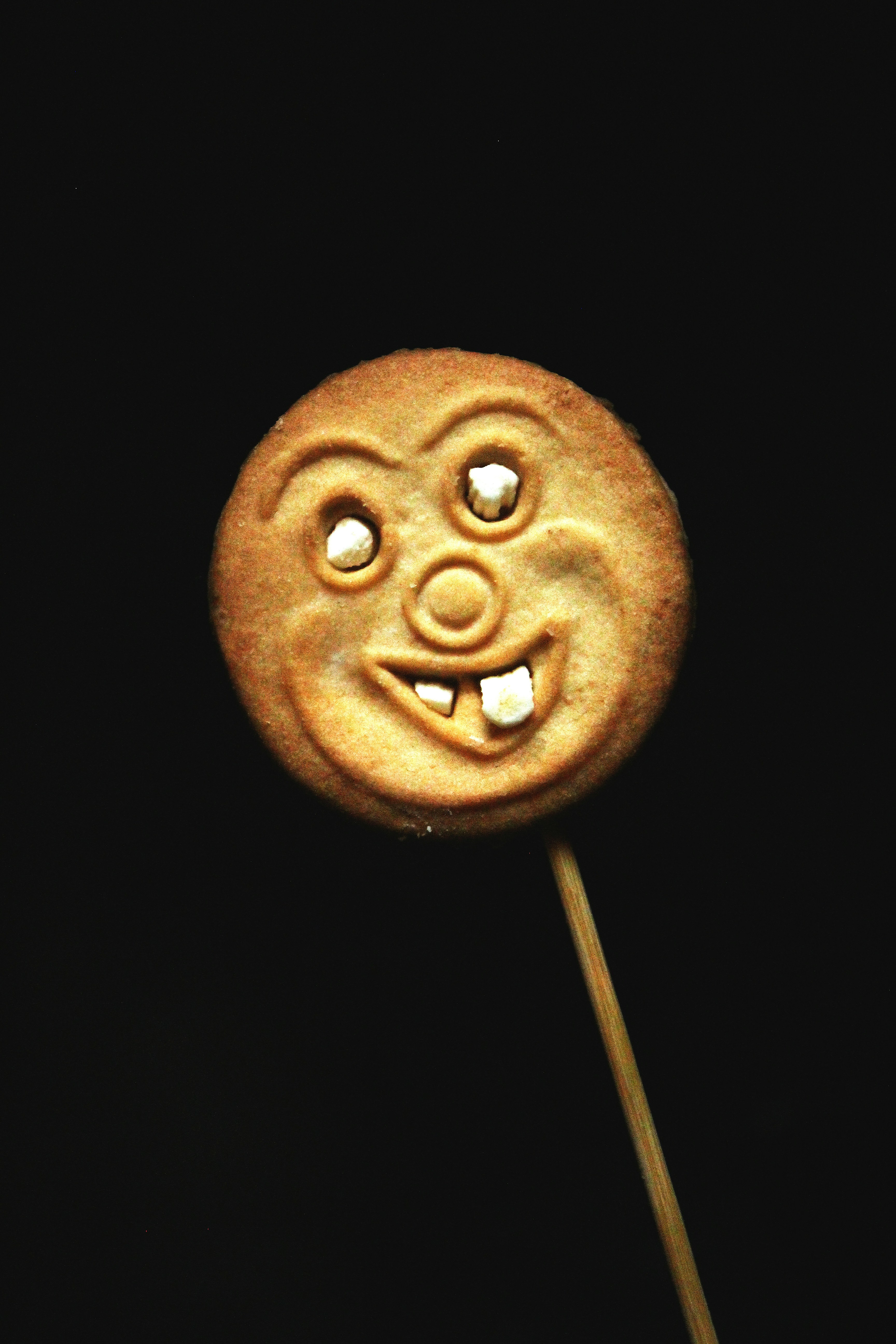 Lonely Laugh: A Cookie Character on a Night Stand