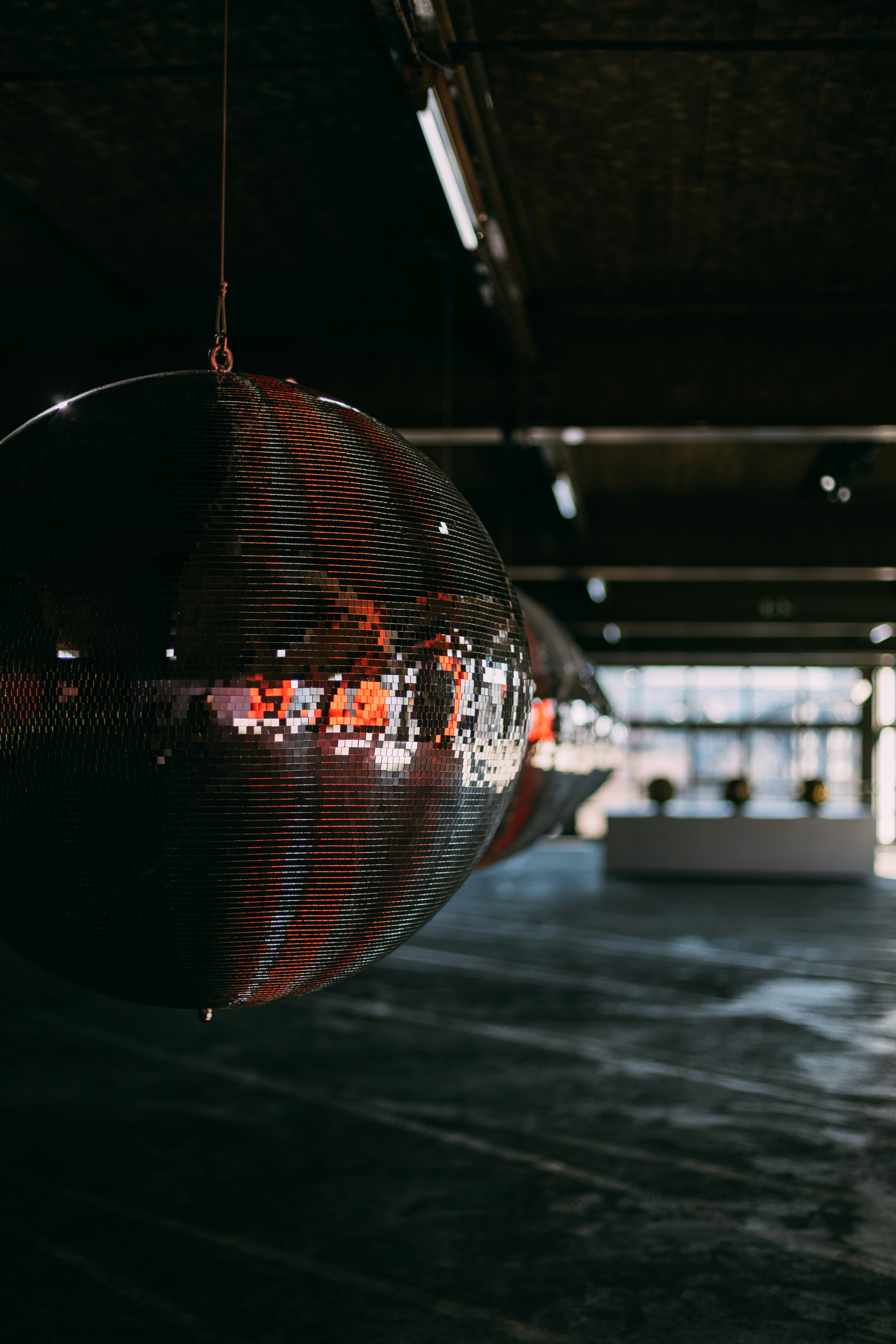 Suspended Orbit in Red: A Shadowy Industrial Space