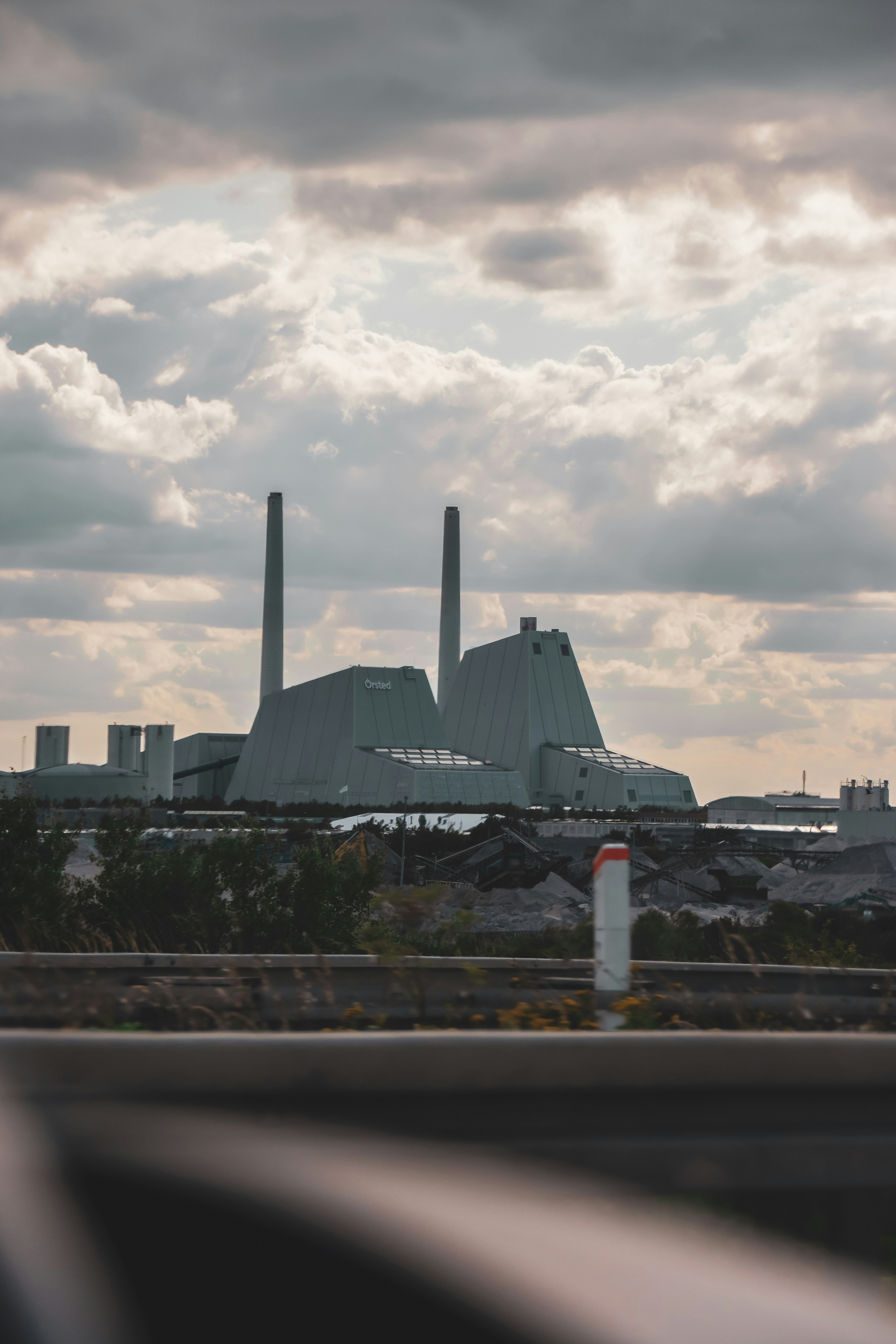 Black and gray factory under gray clouds photo – Free Grey Image on ...