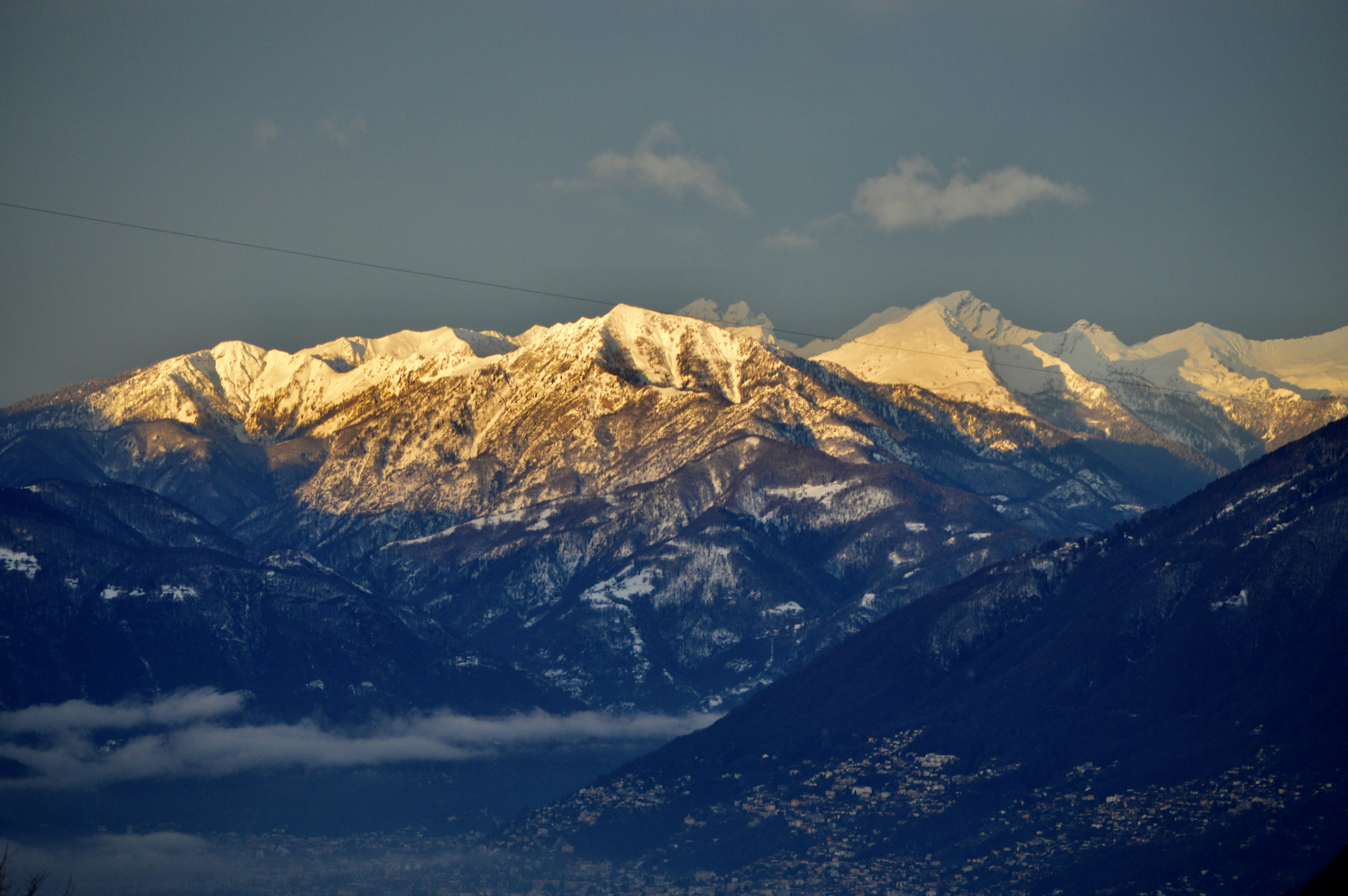Snow covered mountain under blue sky during daytime photo – Free Tessin ...