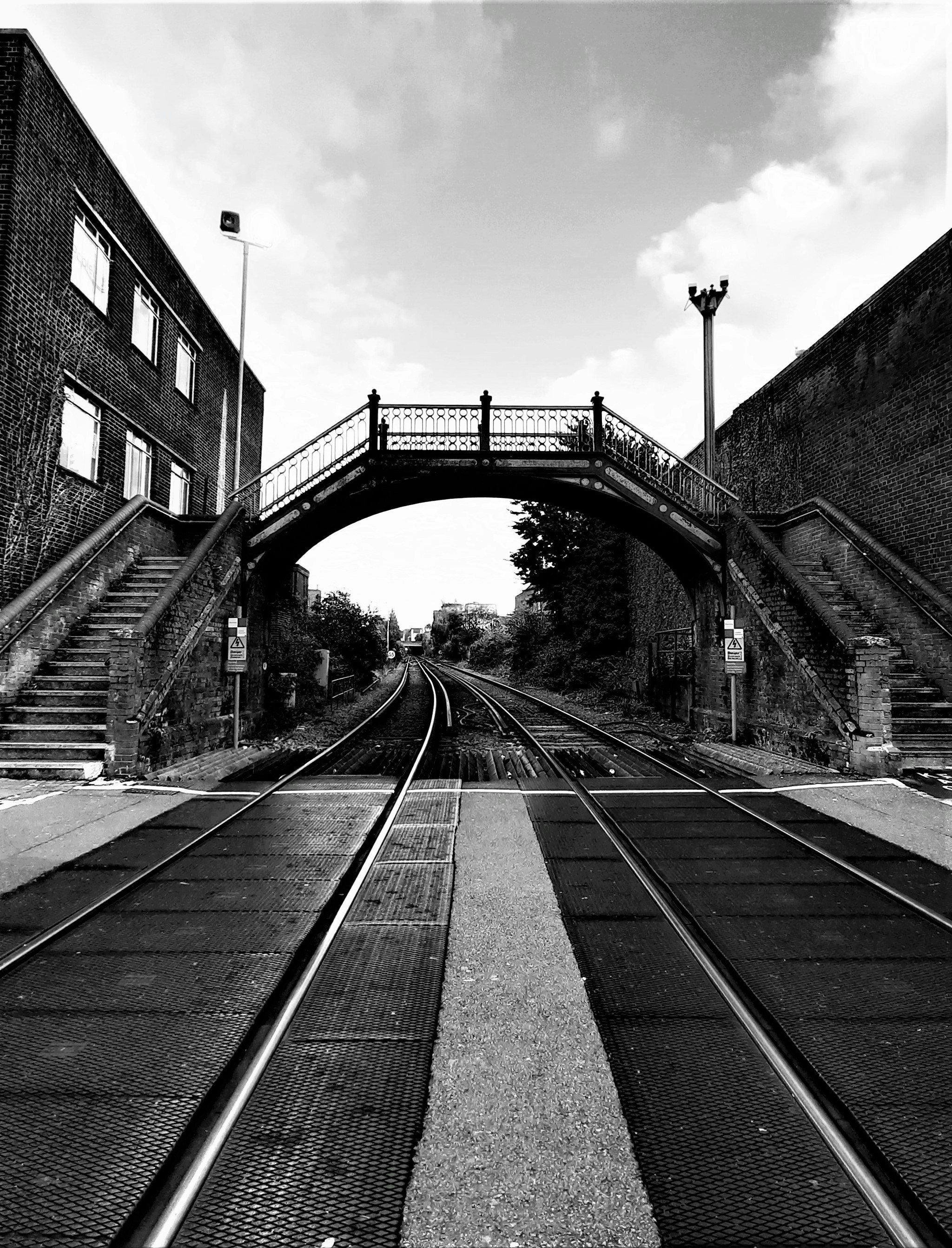 Grayscale photo of train rail photo – Free Poole Image on Unsplash