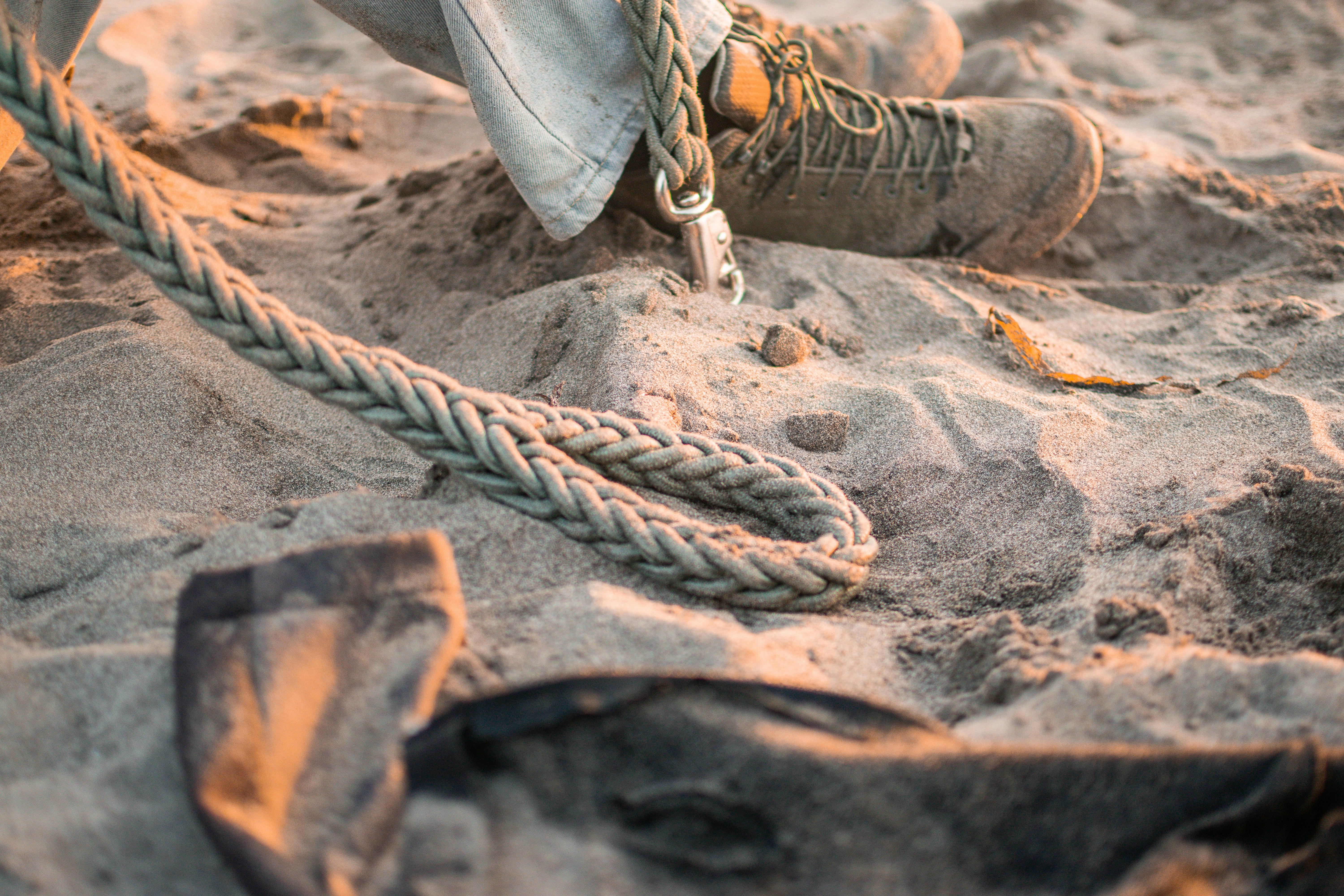 Tethered in the Sand: Rope, Boot, and Quiet Light