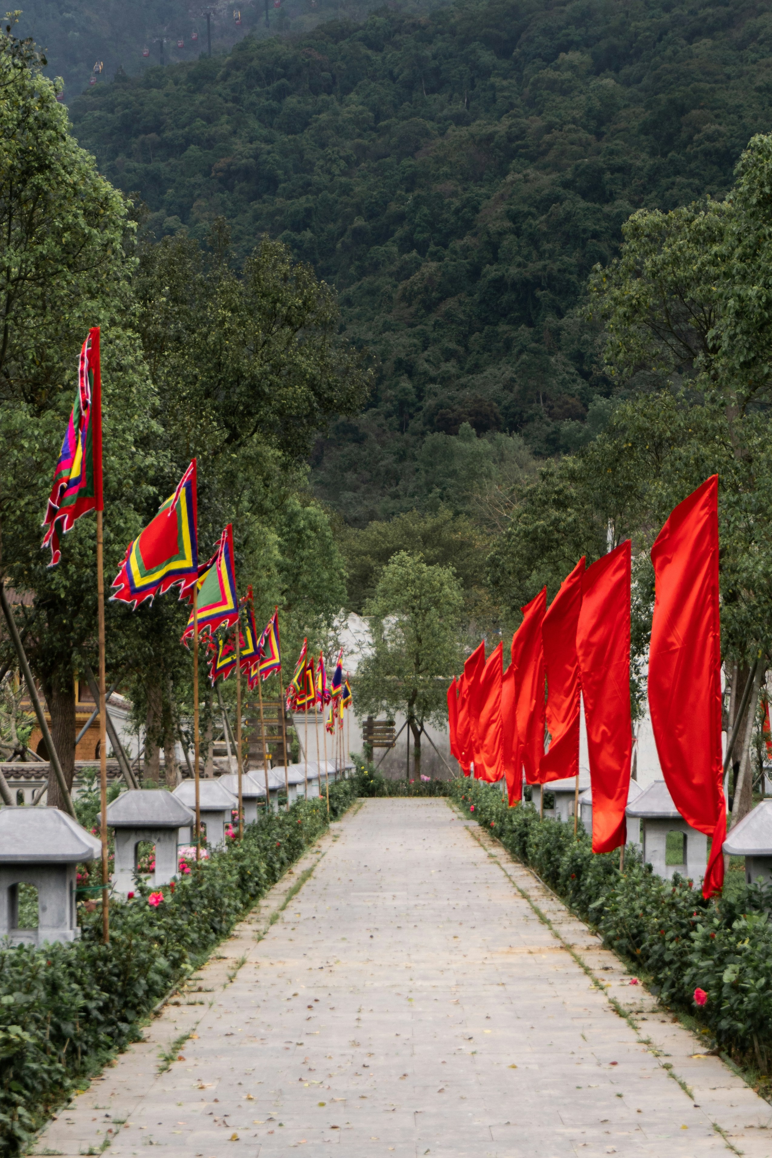 Red and green flags on gray concrete pathway photo – Free Repeat Image ...