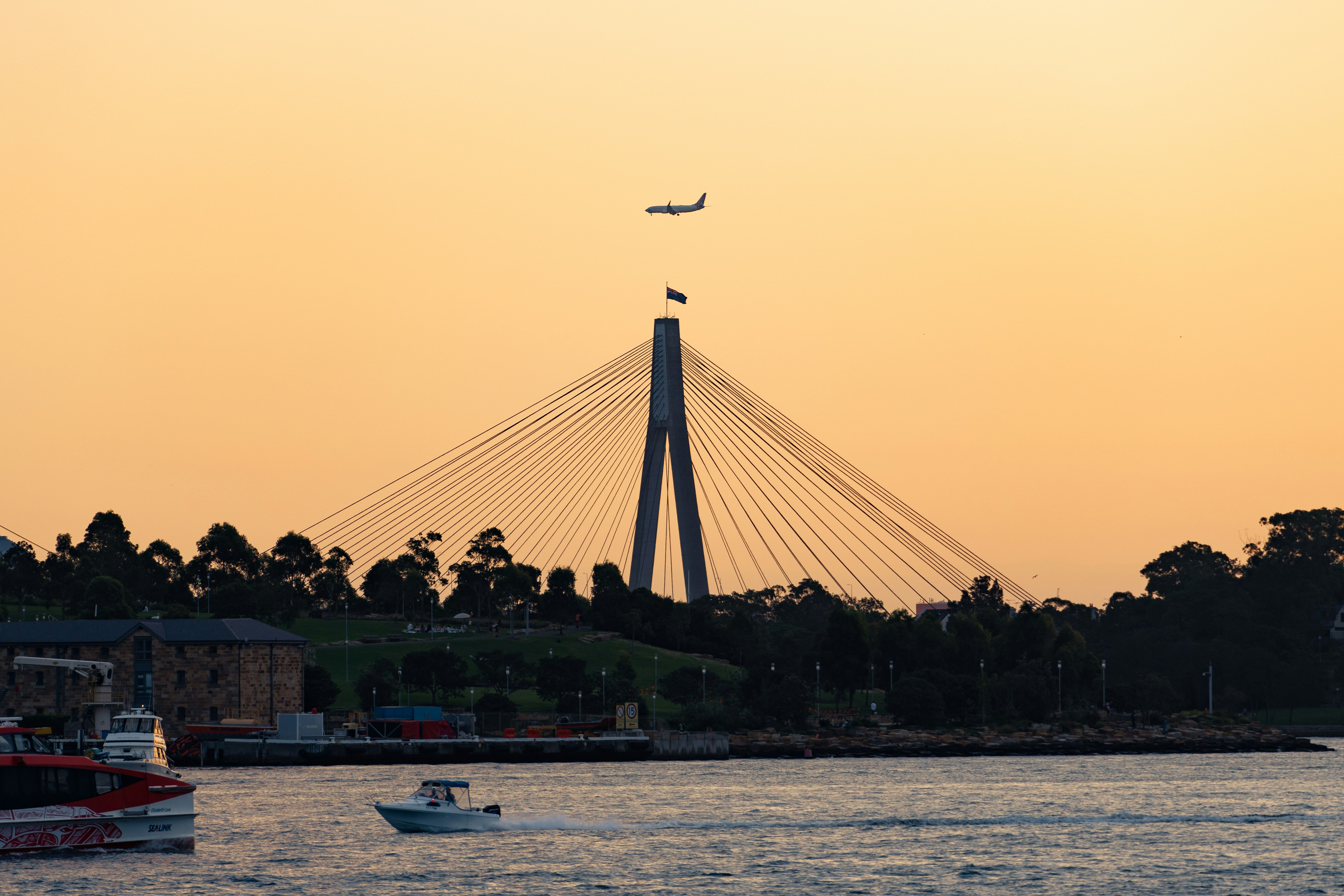 Dusk Span: Plane Tracing the Skybridge Silhouette