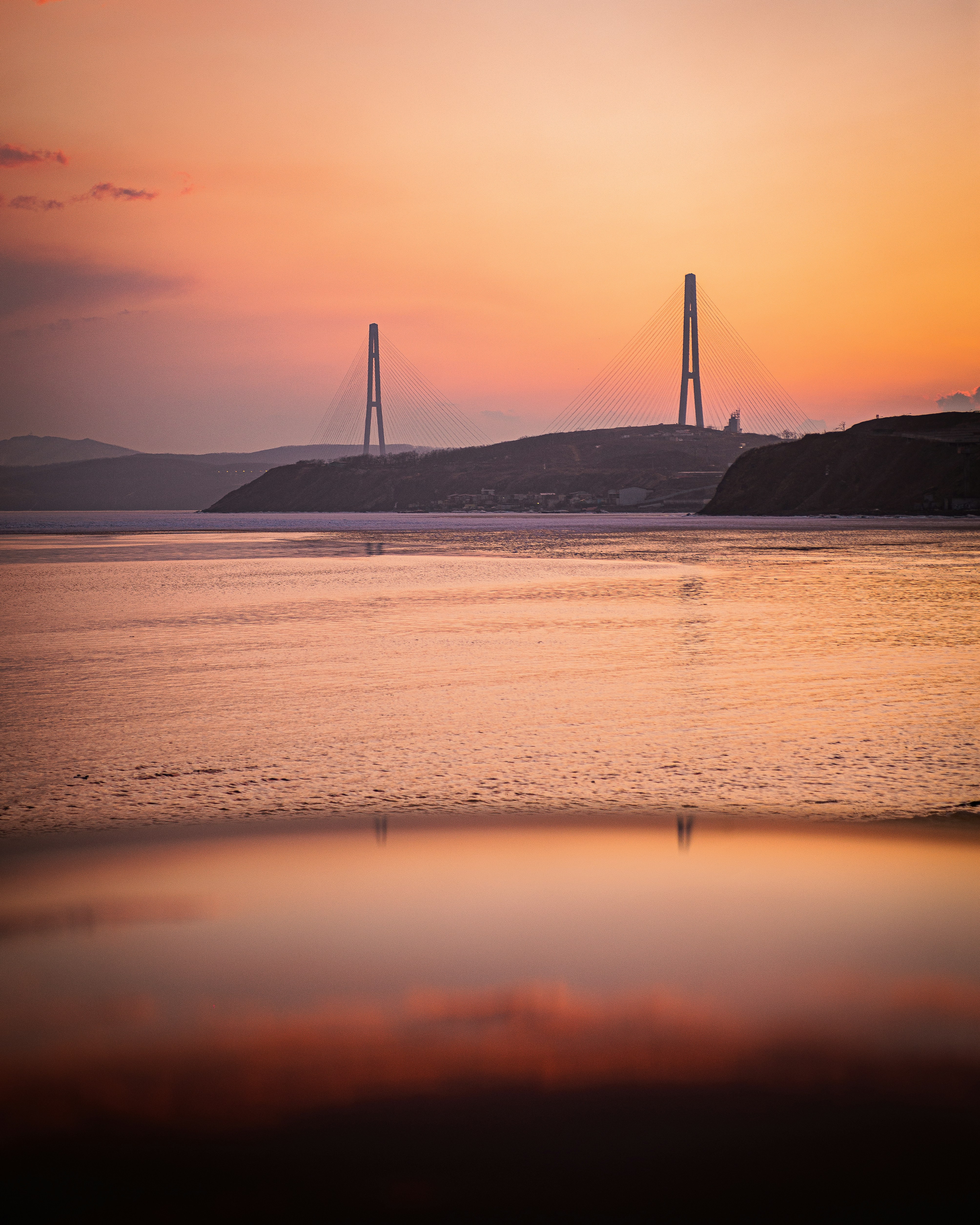 Bridging Horizons: A Serene Twilight Reflection