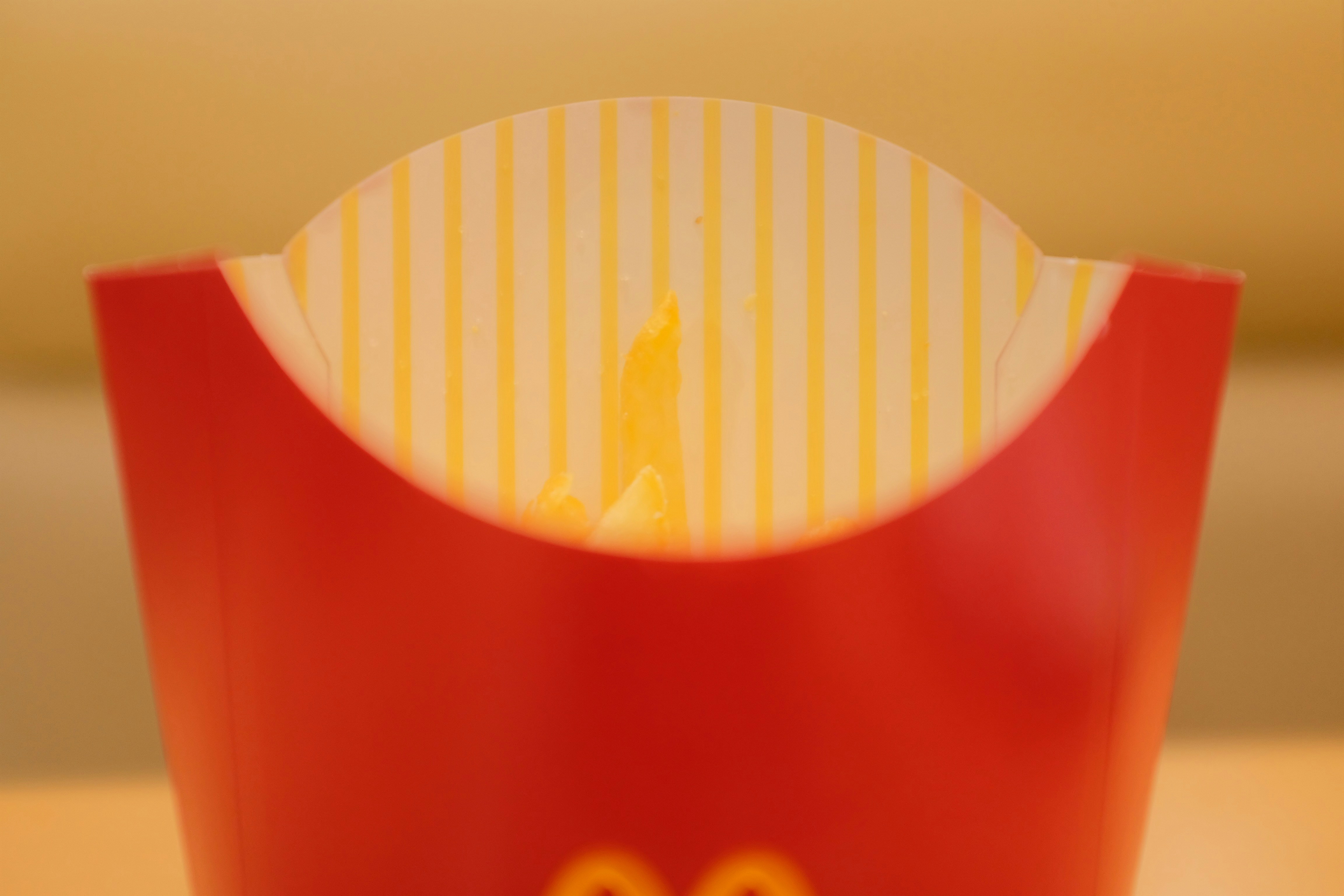 white and orange plastic container