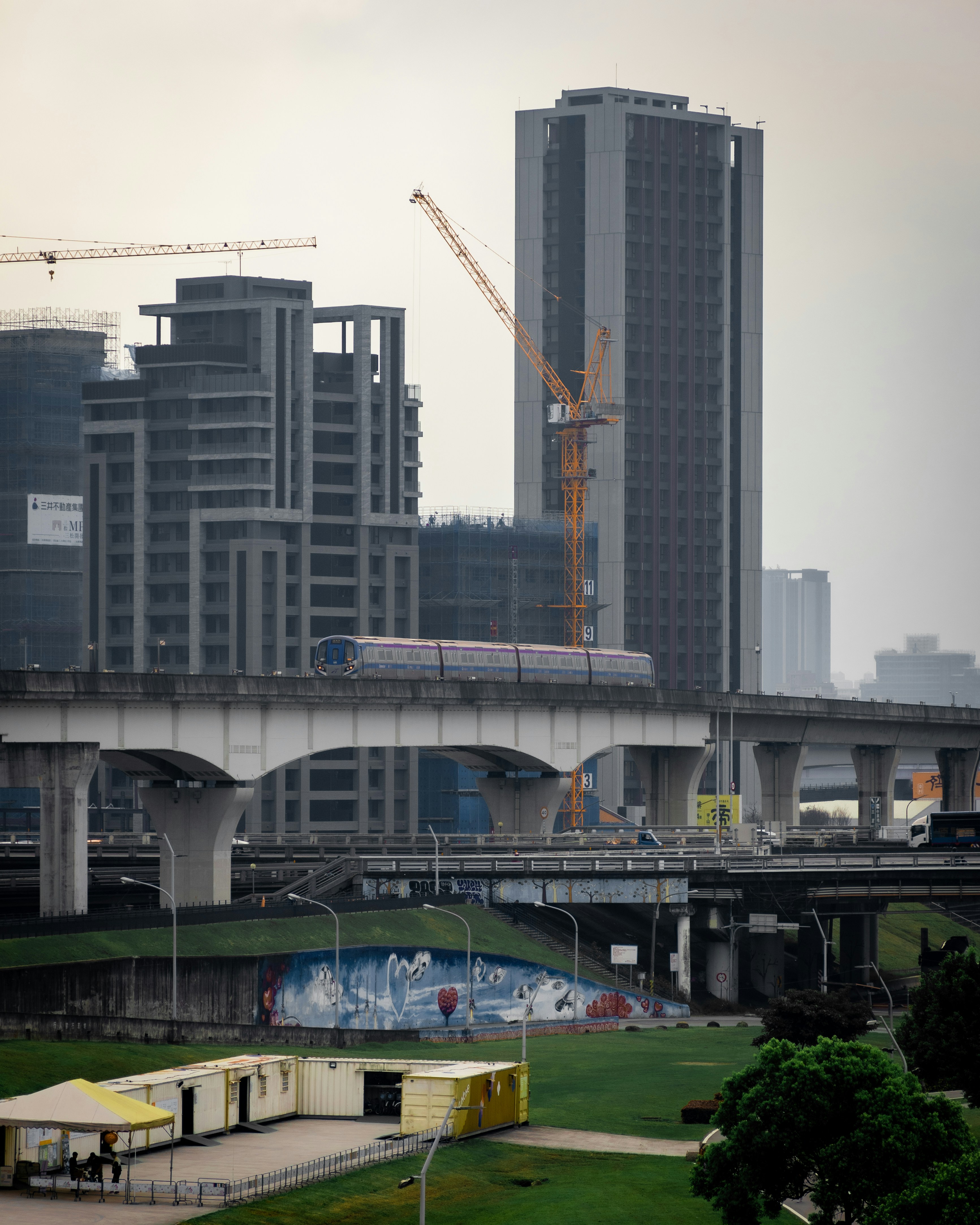 White and gray concrete building near bridge during daytime photo ...